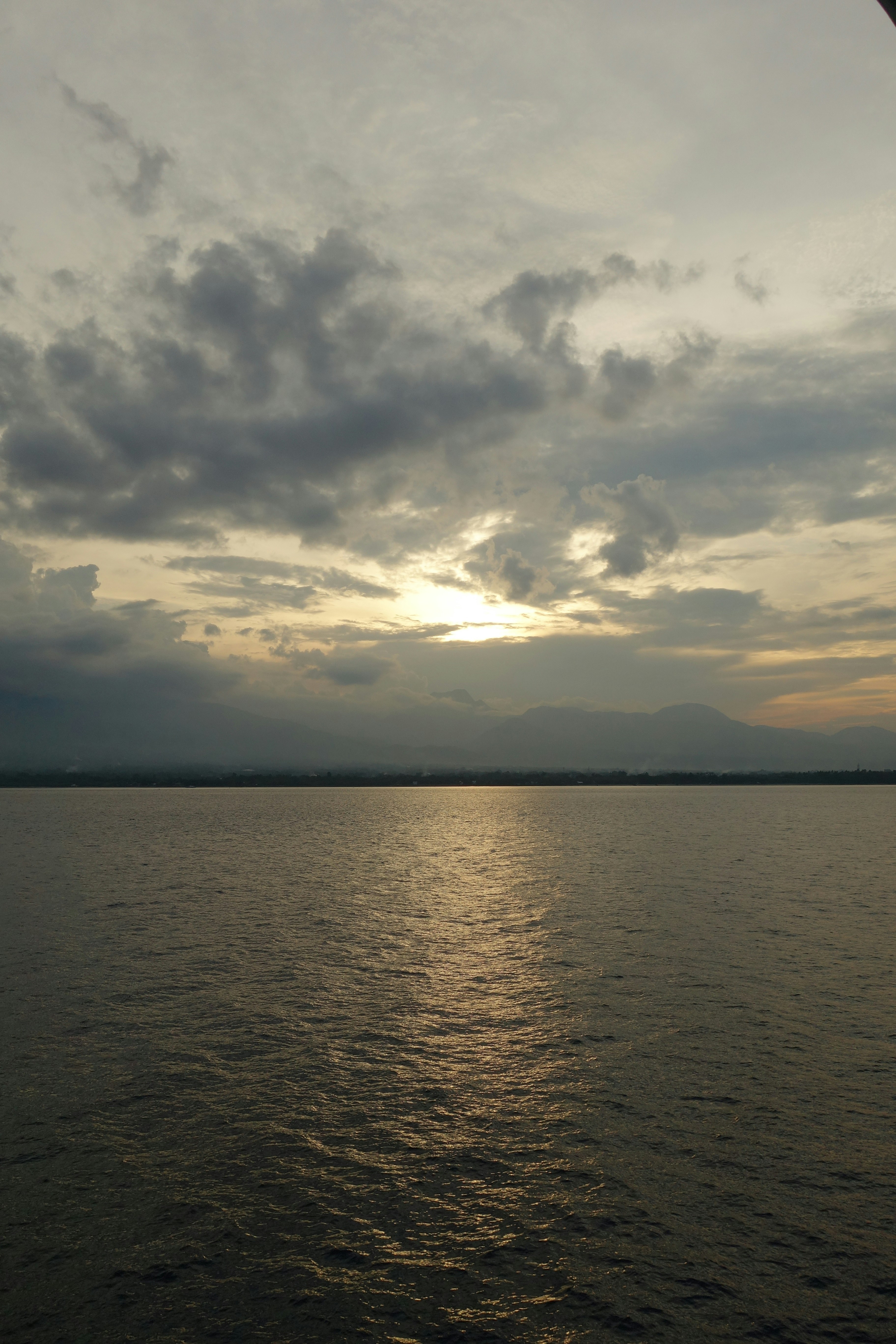 Sunlit Horizon on a Quiet Lake