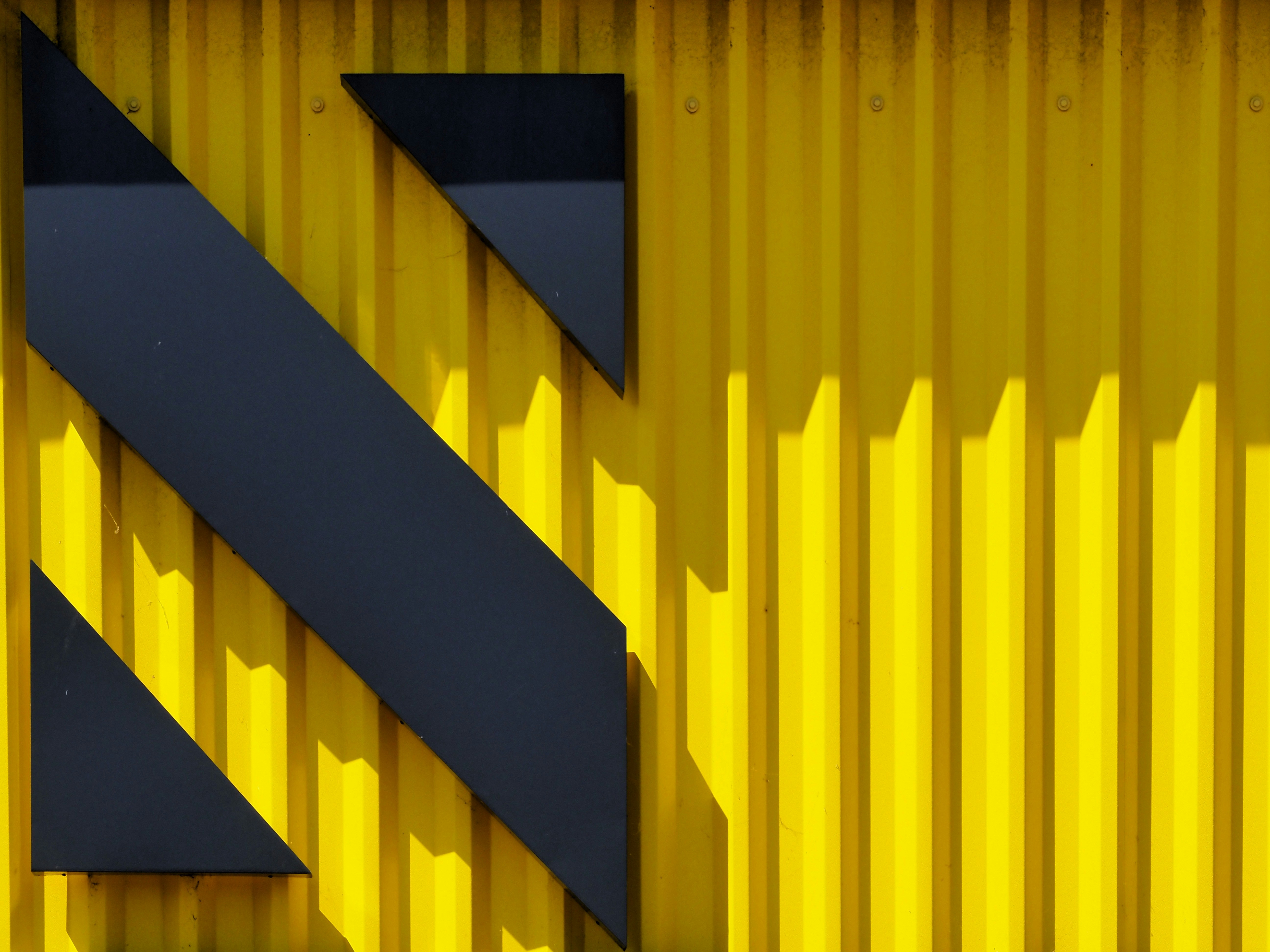 Industrial Geometry: Yellow Ribs and Black Diagonals