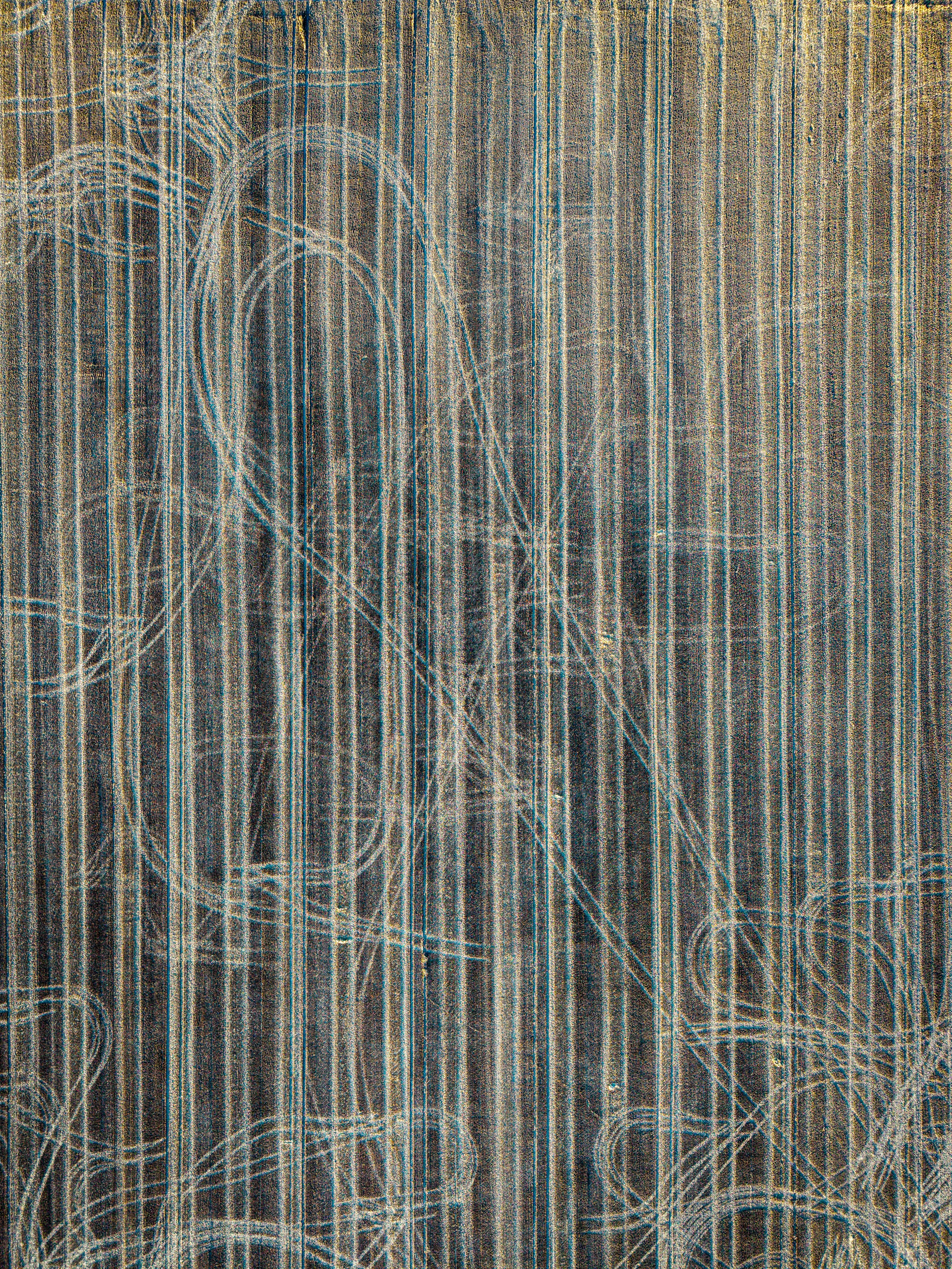 Textured weathered panel with vertical lines and looping wire-like patterns, creating an abstract, tactile composition.