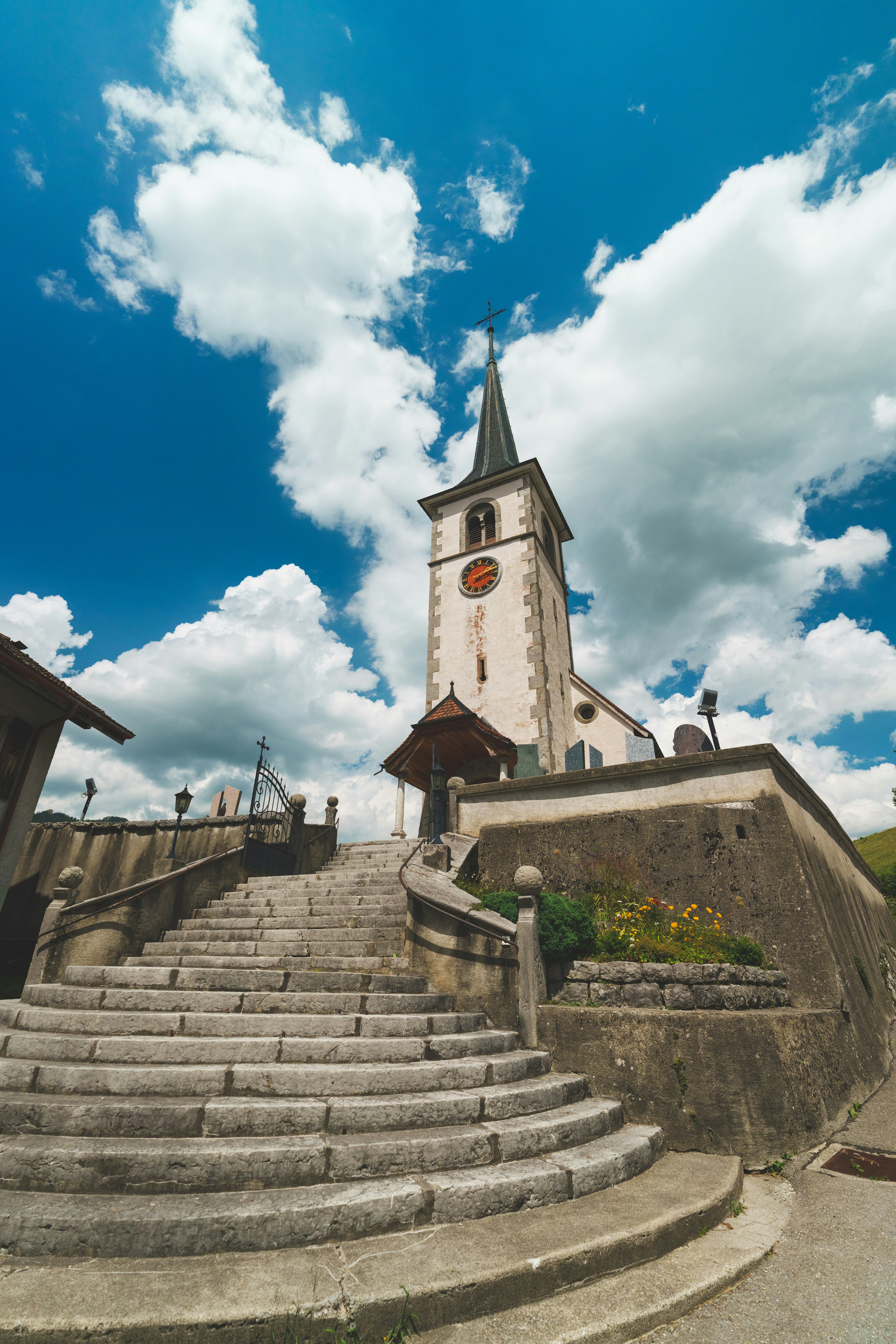 Clocktower at the Foot of the Sky: A Curved Staircase to the Spire