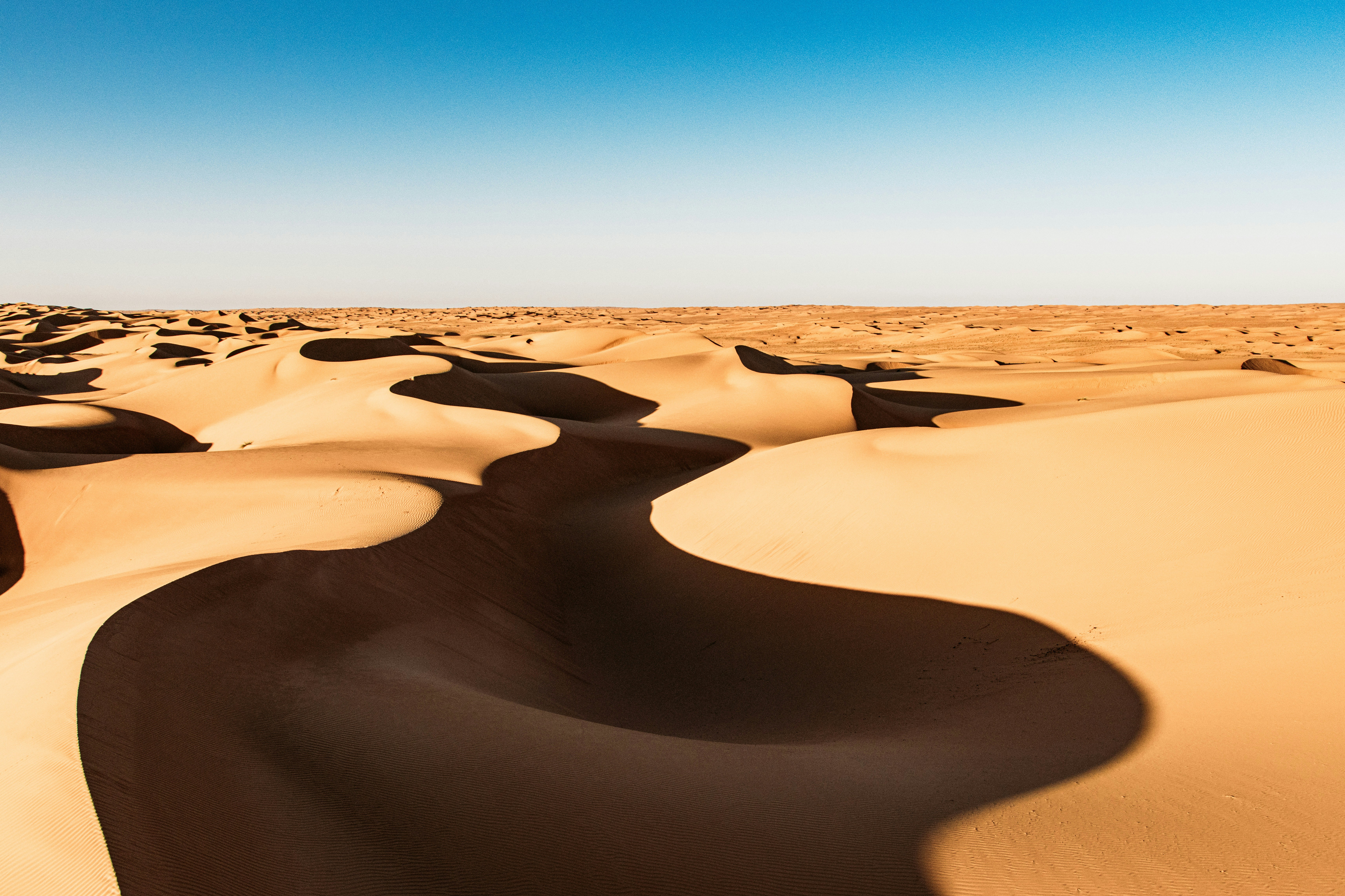 Rippling Dunes Under a Cerulean Sky
