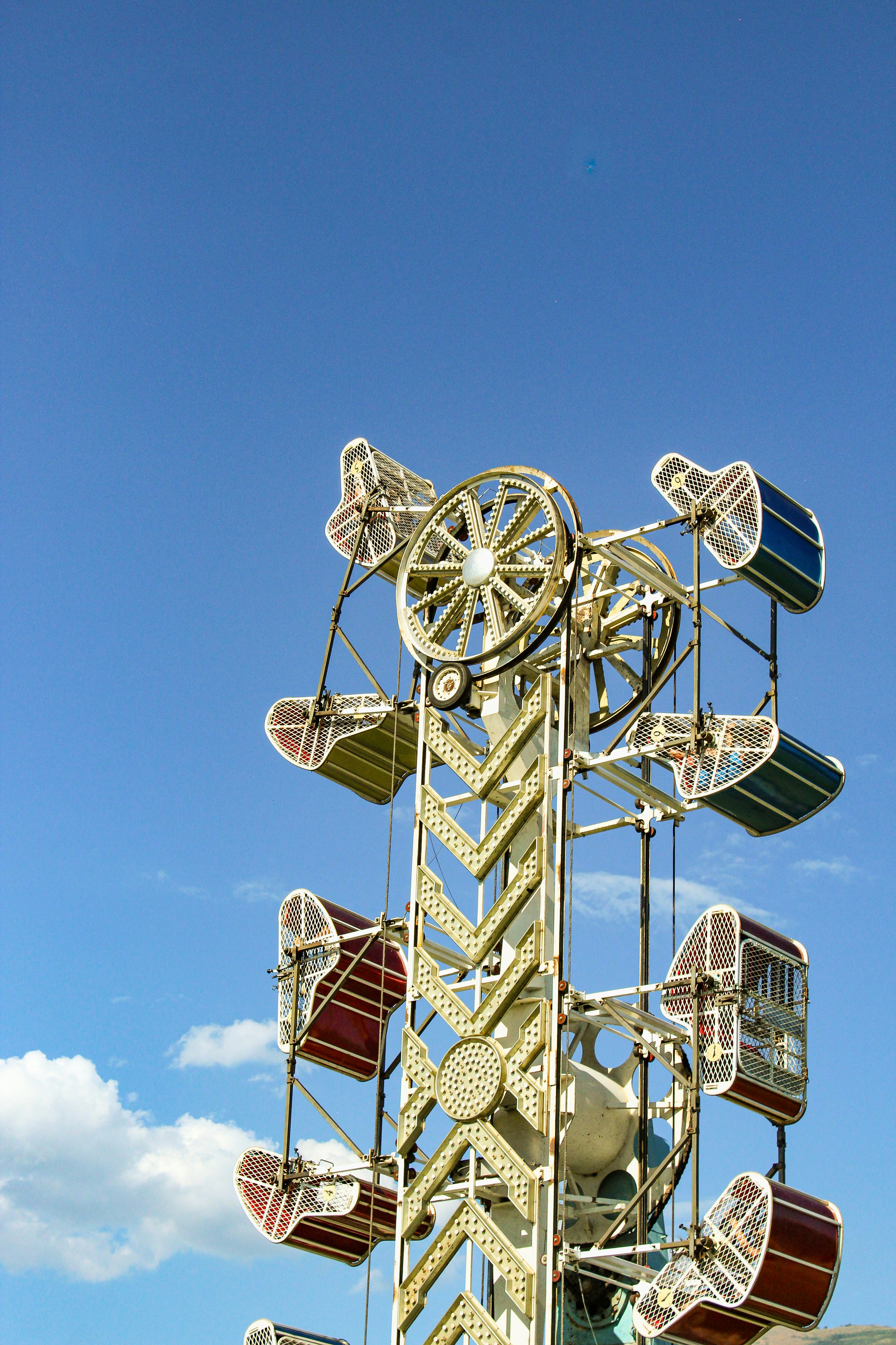 Ferris-Wan Galactic Lattice: A Vintage Cable-Carreled Tower Against Clear Blue