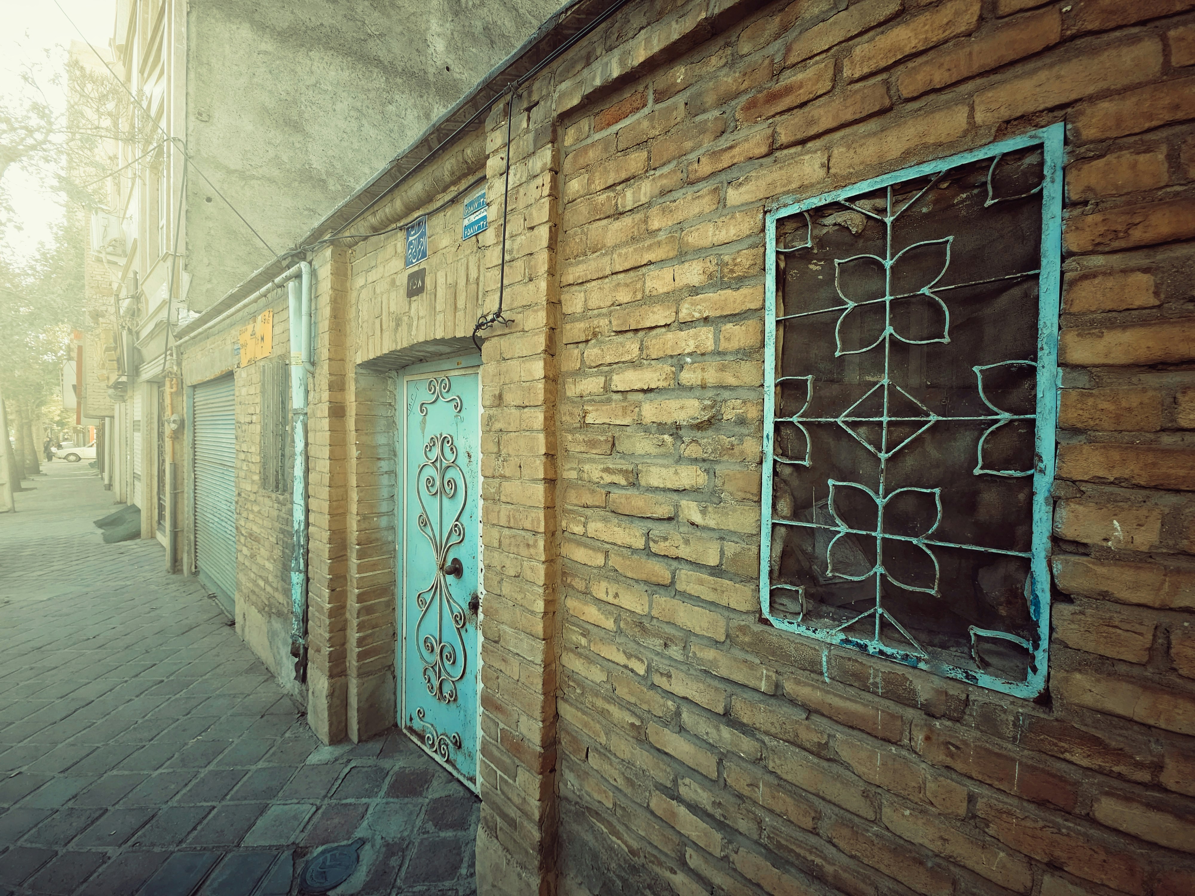 Brick Lane Echoes: A Quiet Corridor of Wrought-Iron Windows