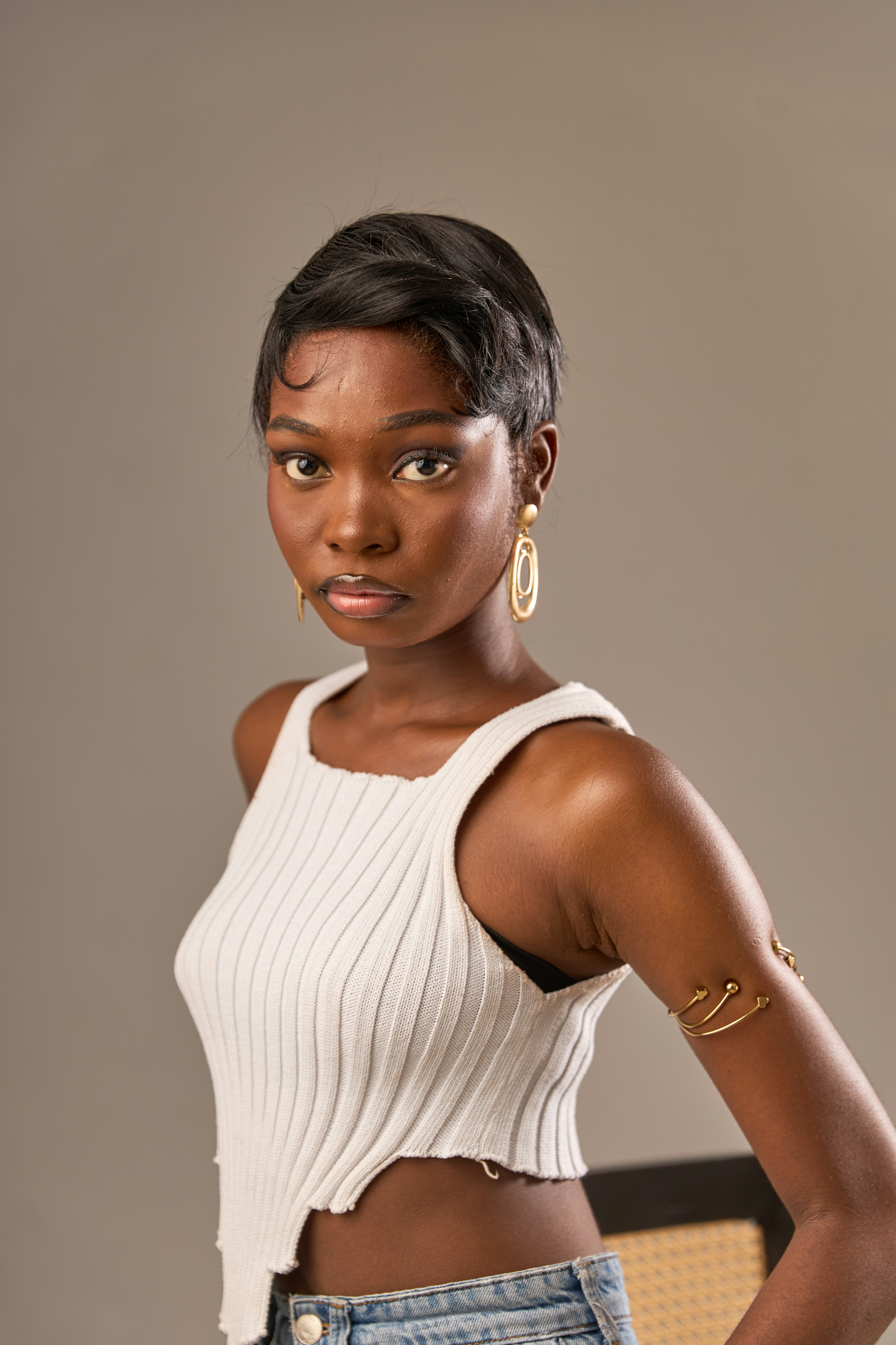 Glowing Confidence: Studio Portrait of a Bold Young Woman