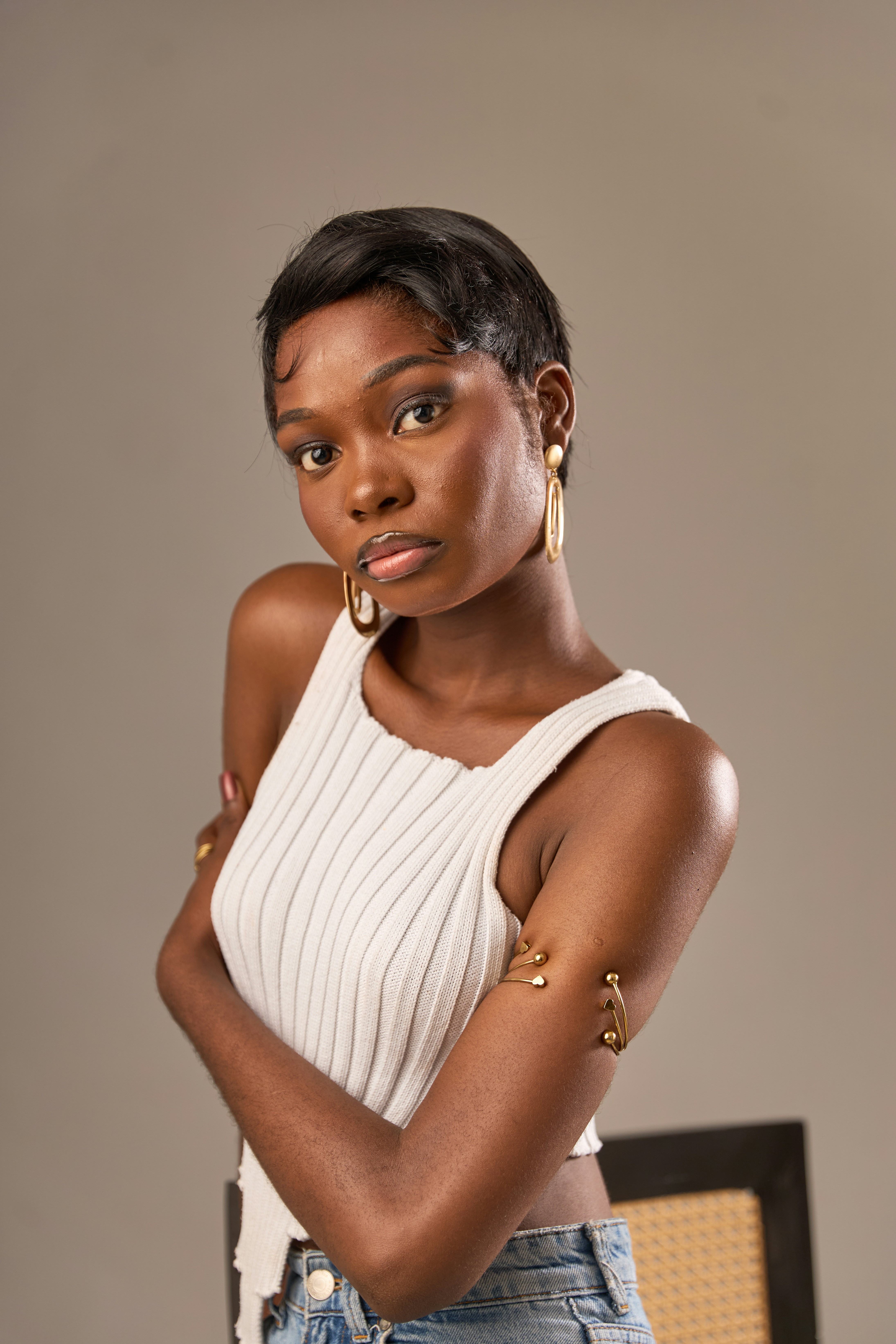 Poise in Cream: A Portrait of Quiet Confidence