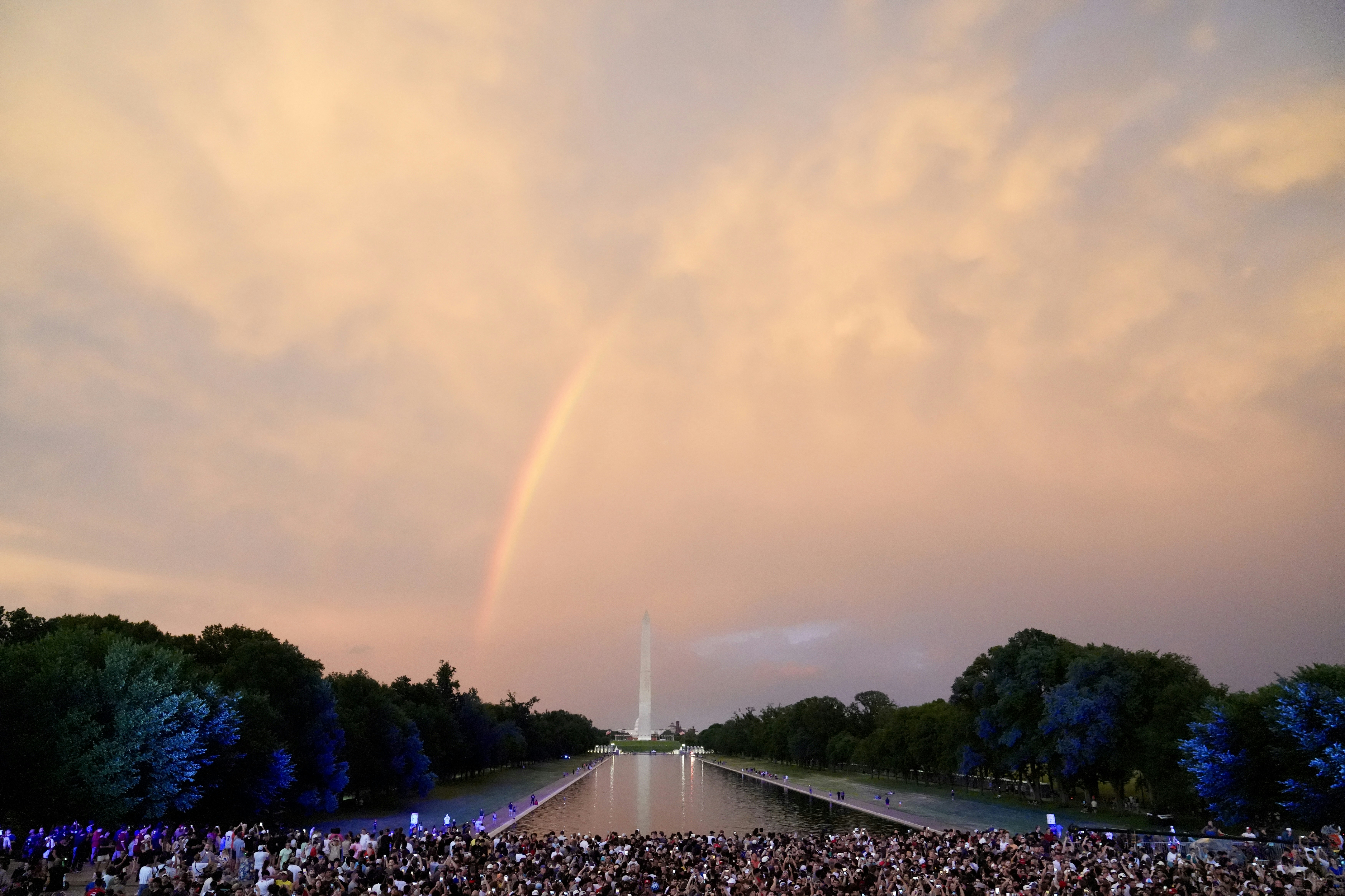 Arc of Light Over the Crowd: A Rainbow Dawn at the National Celebration