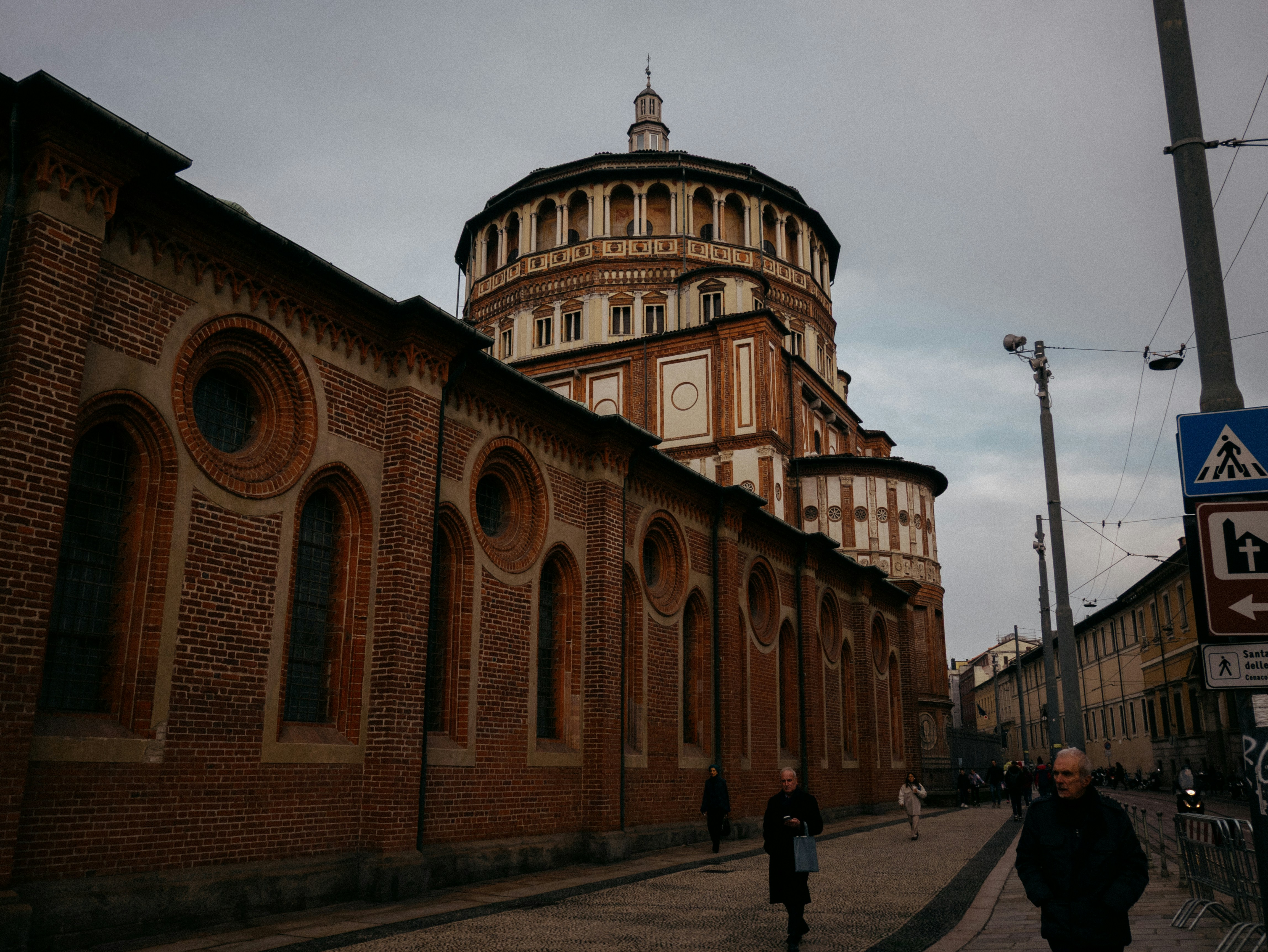 Circular Dome over Brick Gallery: A City Street Breathes Past and Present