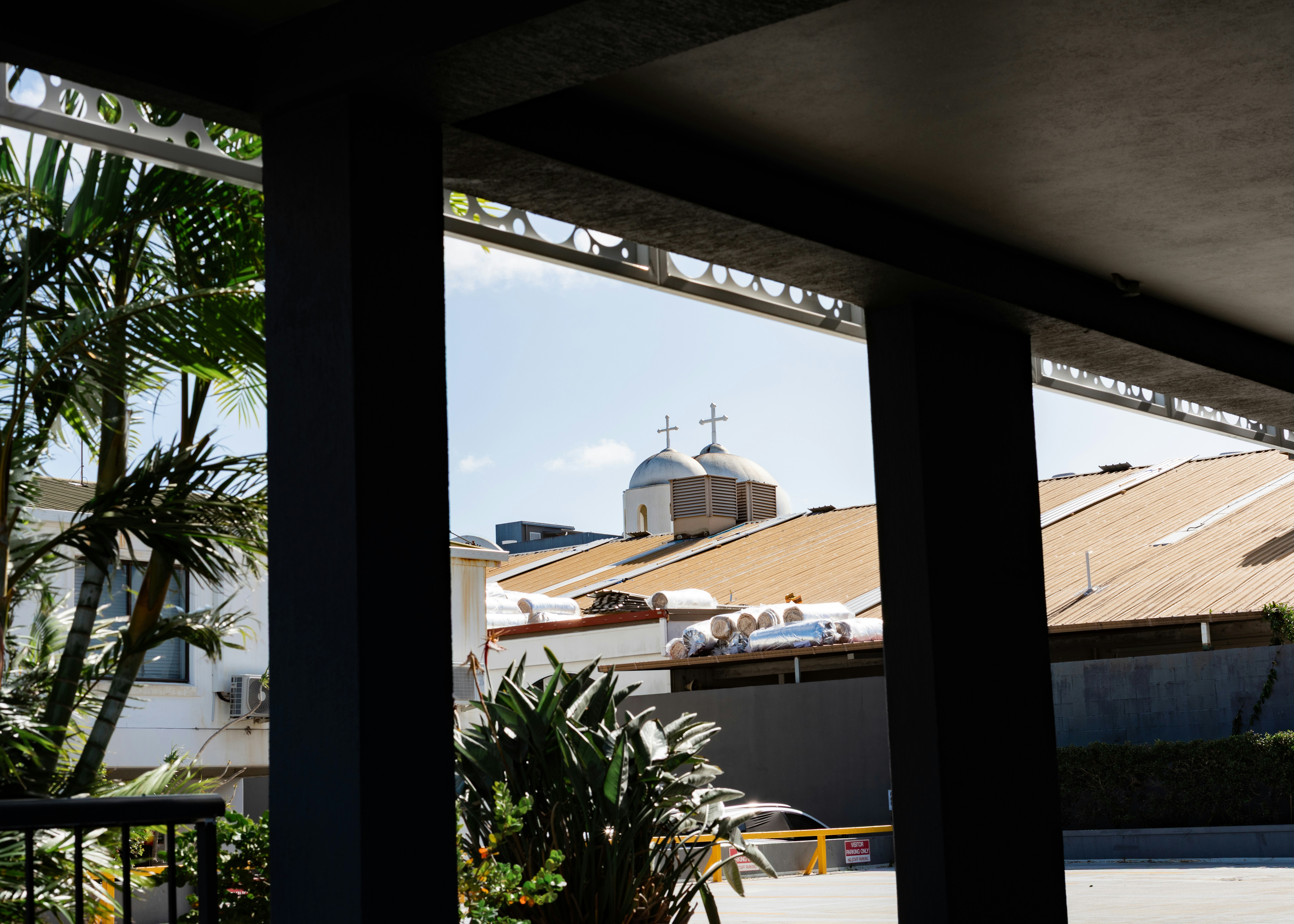 Hidden Sanctuary: Crescent Domes Beneath Shaded Beams