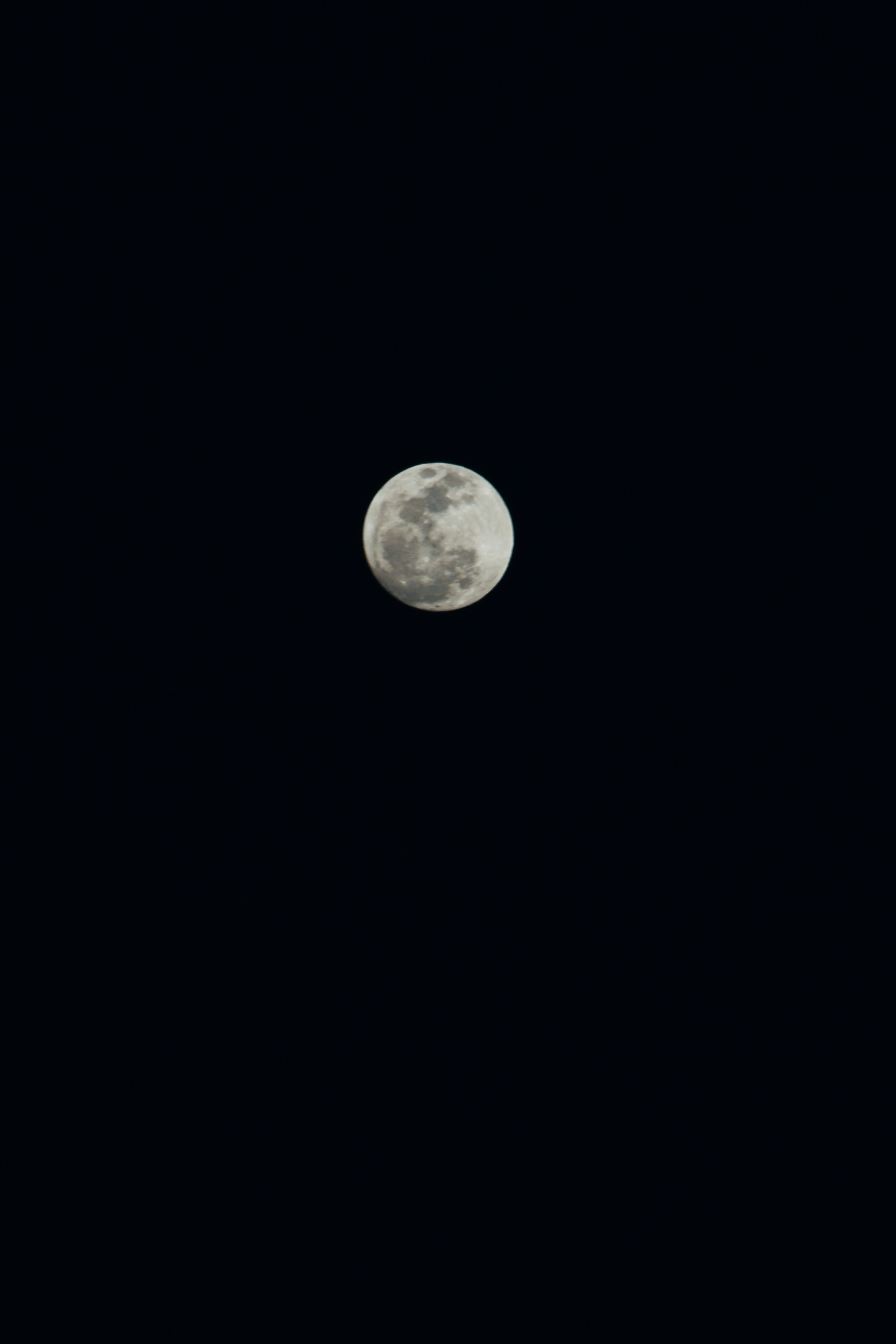 Lone Moon in a Velvet Sky: A Quiet Night Observation