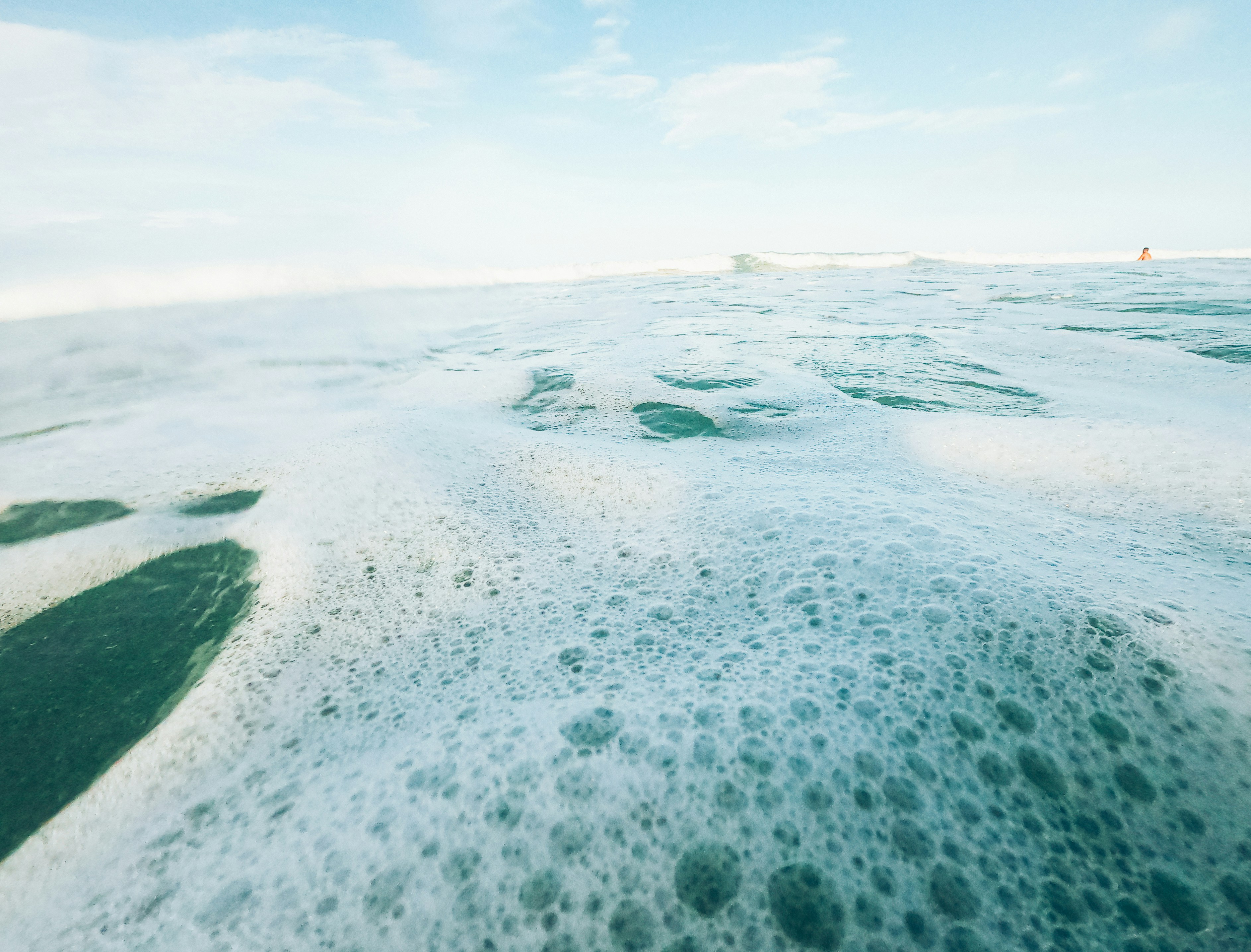 Foamy Seascape at the World Horizon