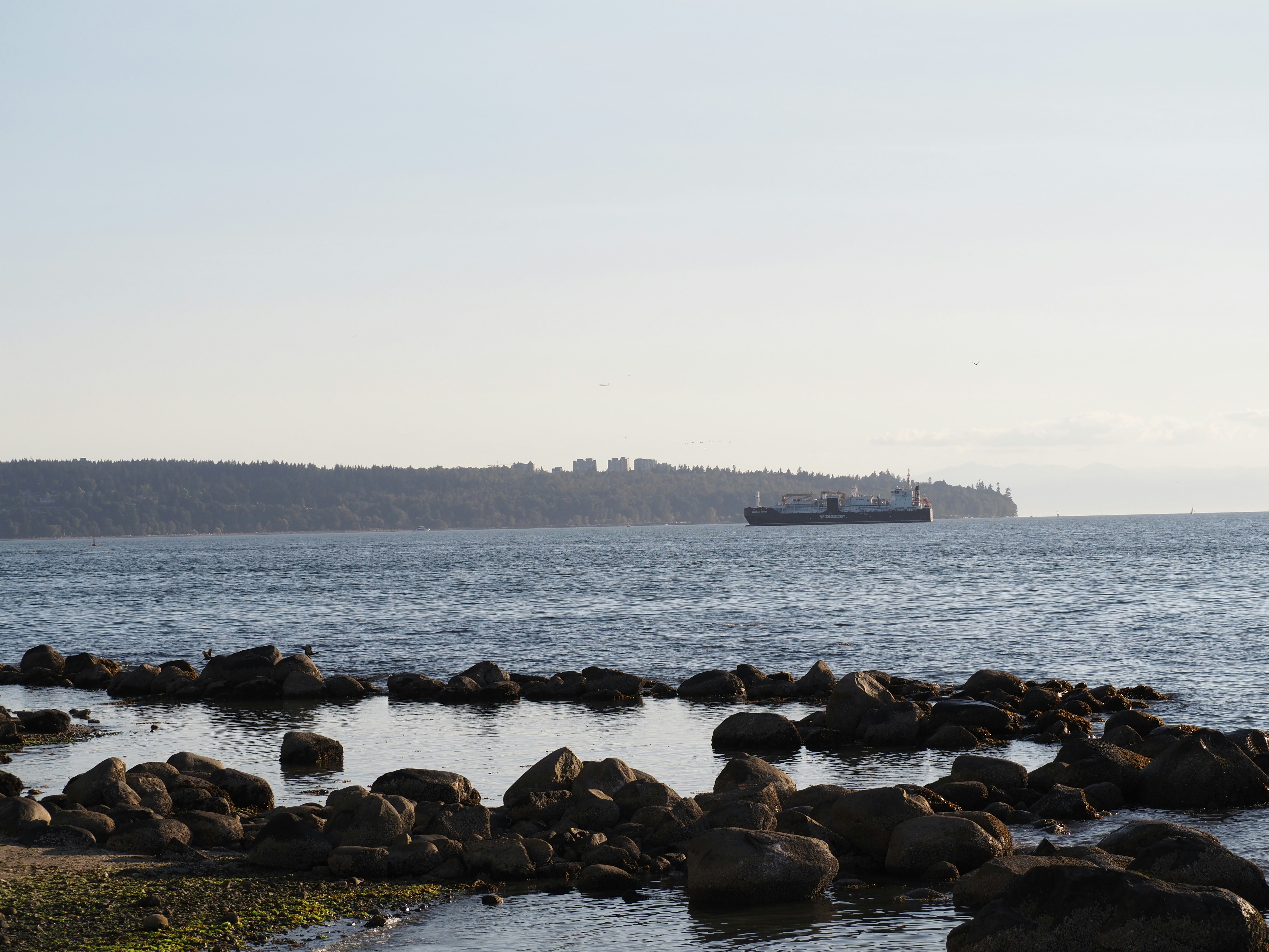 Coastal Vessel Beneath a Quiet Dusk Horizon