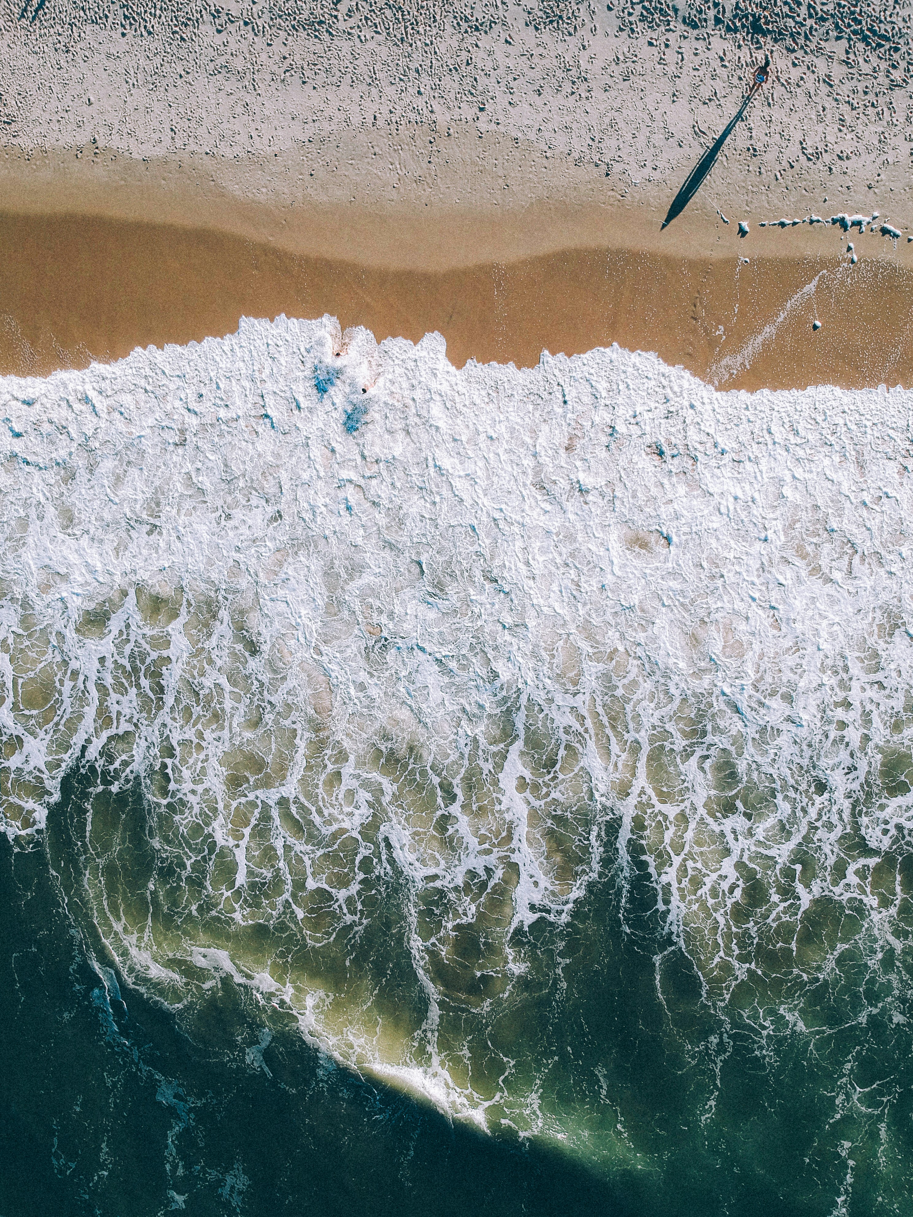 Surf Crest Etching: Aerial Portrait of Waves Meeting Shore