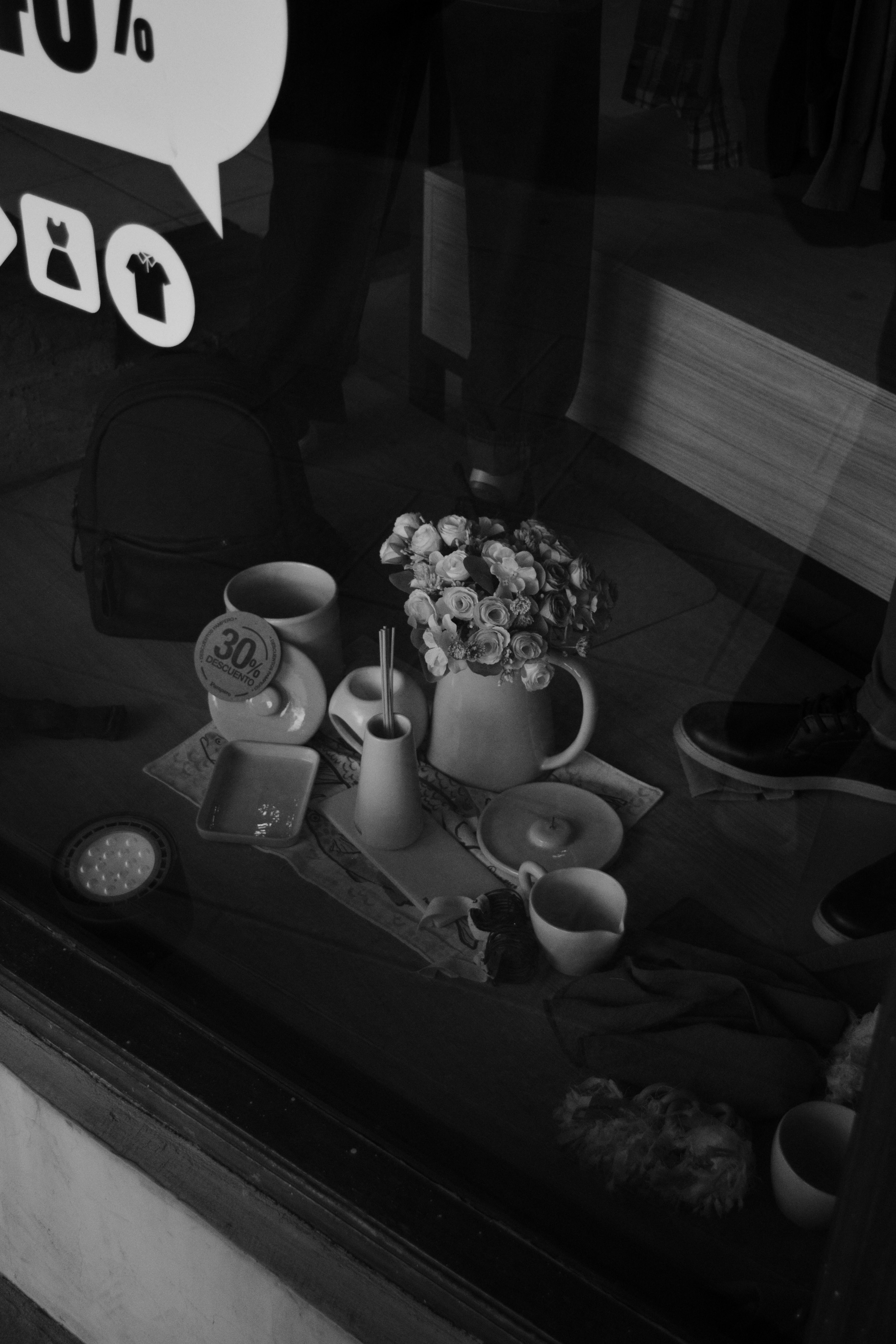 Midnight Still Life: Flowers, Mug, and Cup on a City Window