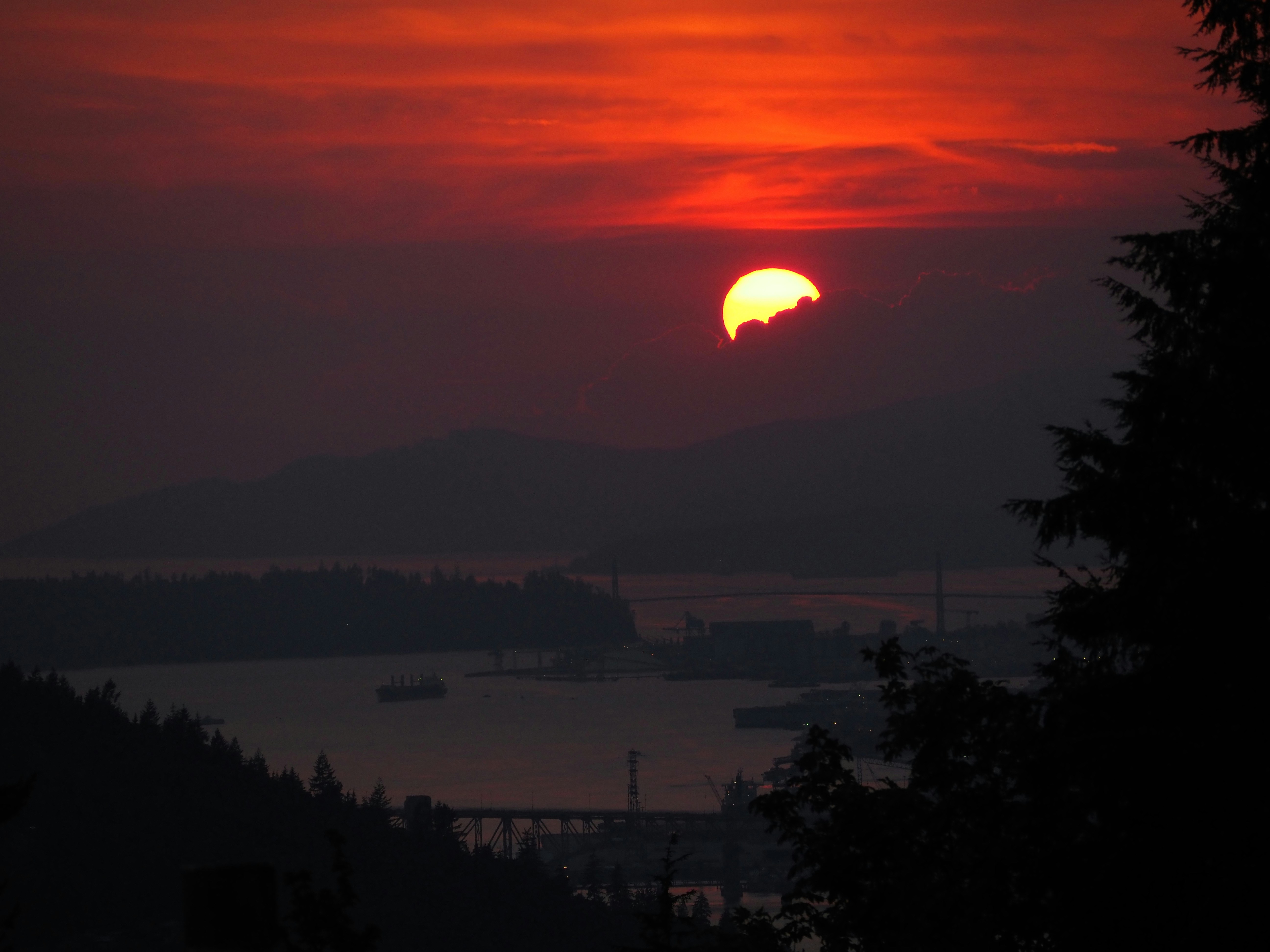 Crimson Horizon Over Quiet Waters