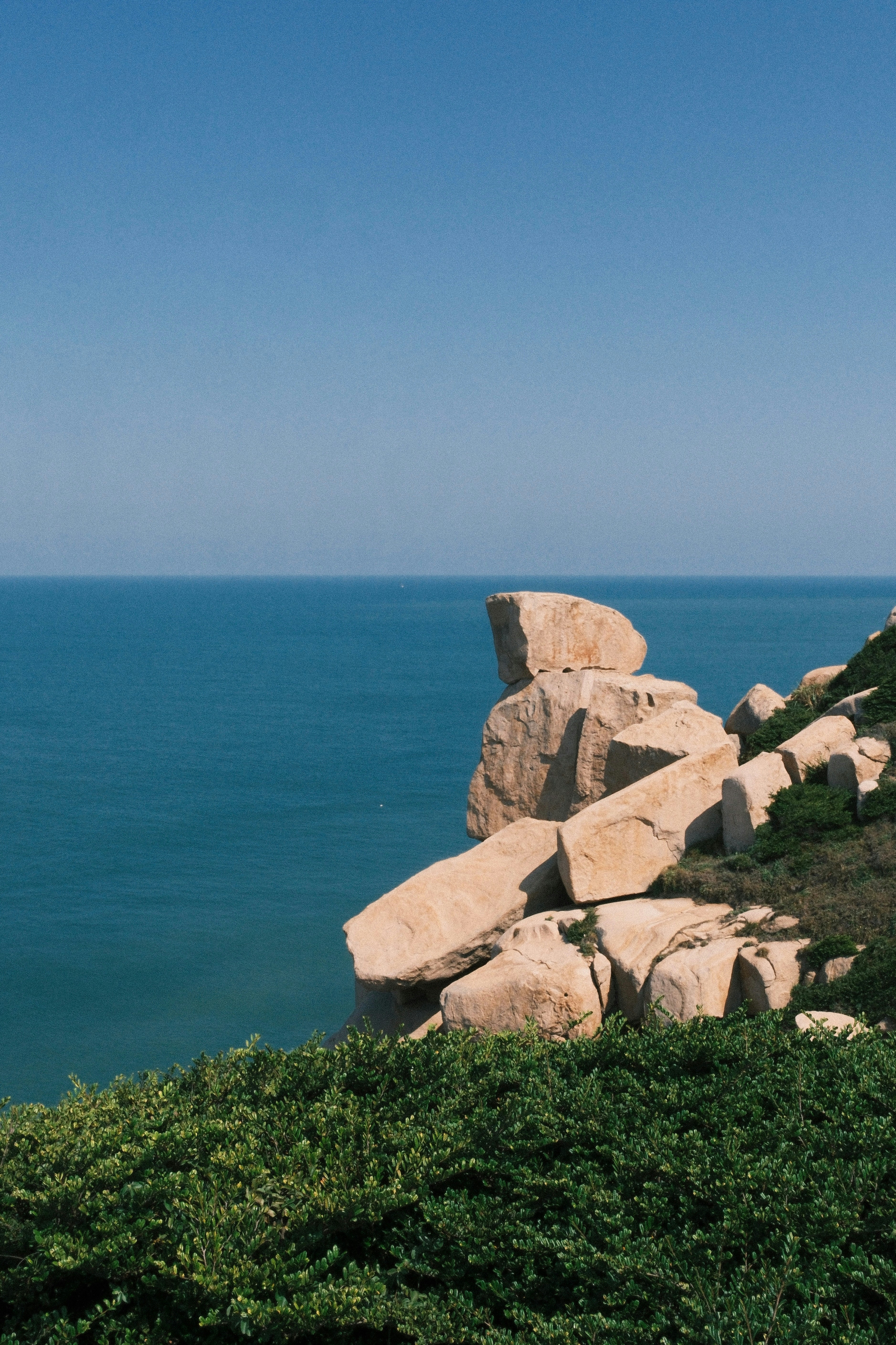 Coastal Giants: A Quiet Overlook of Weathered Cliffs and Sea