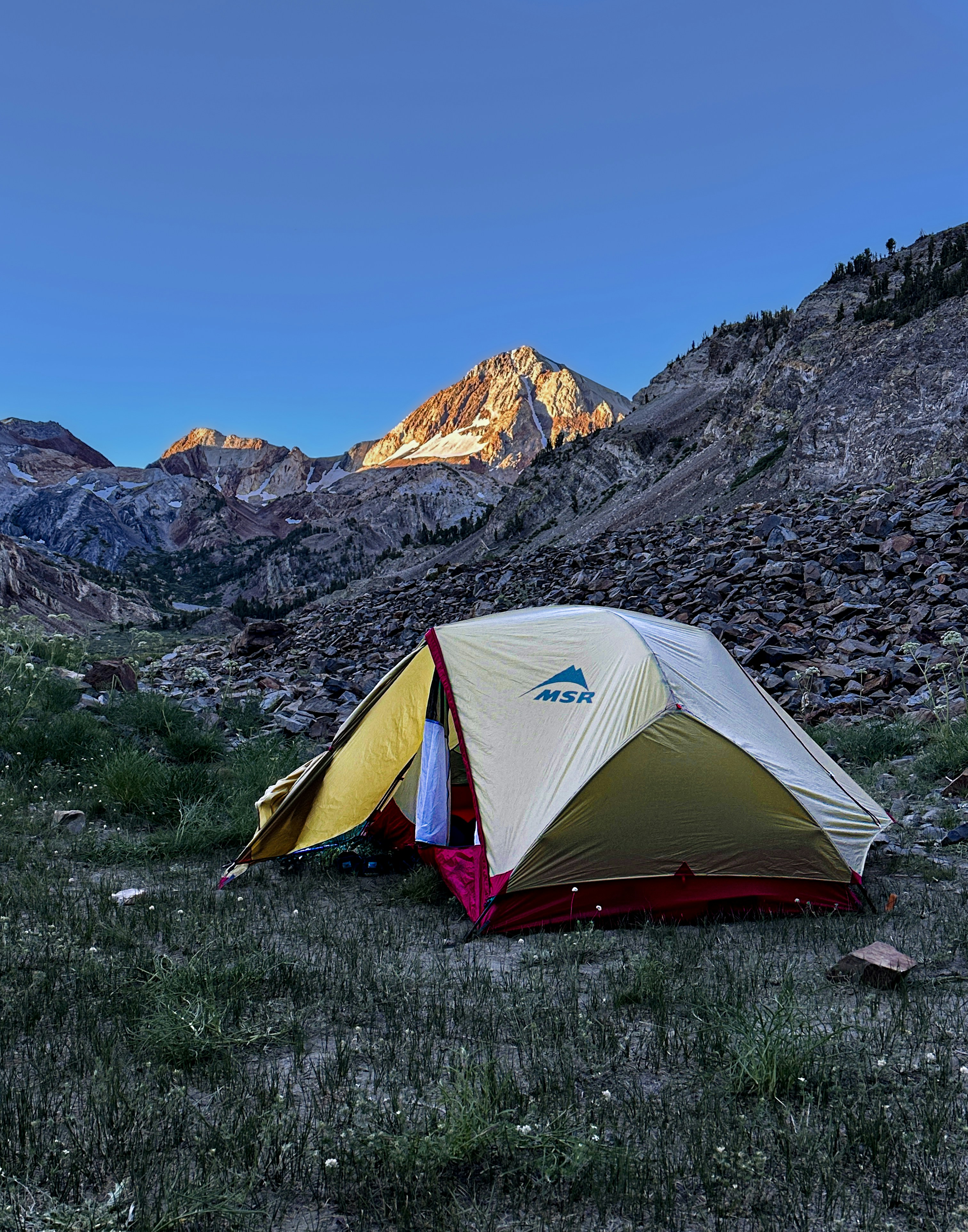 Golden Peak Camp under a Blue Dome
