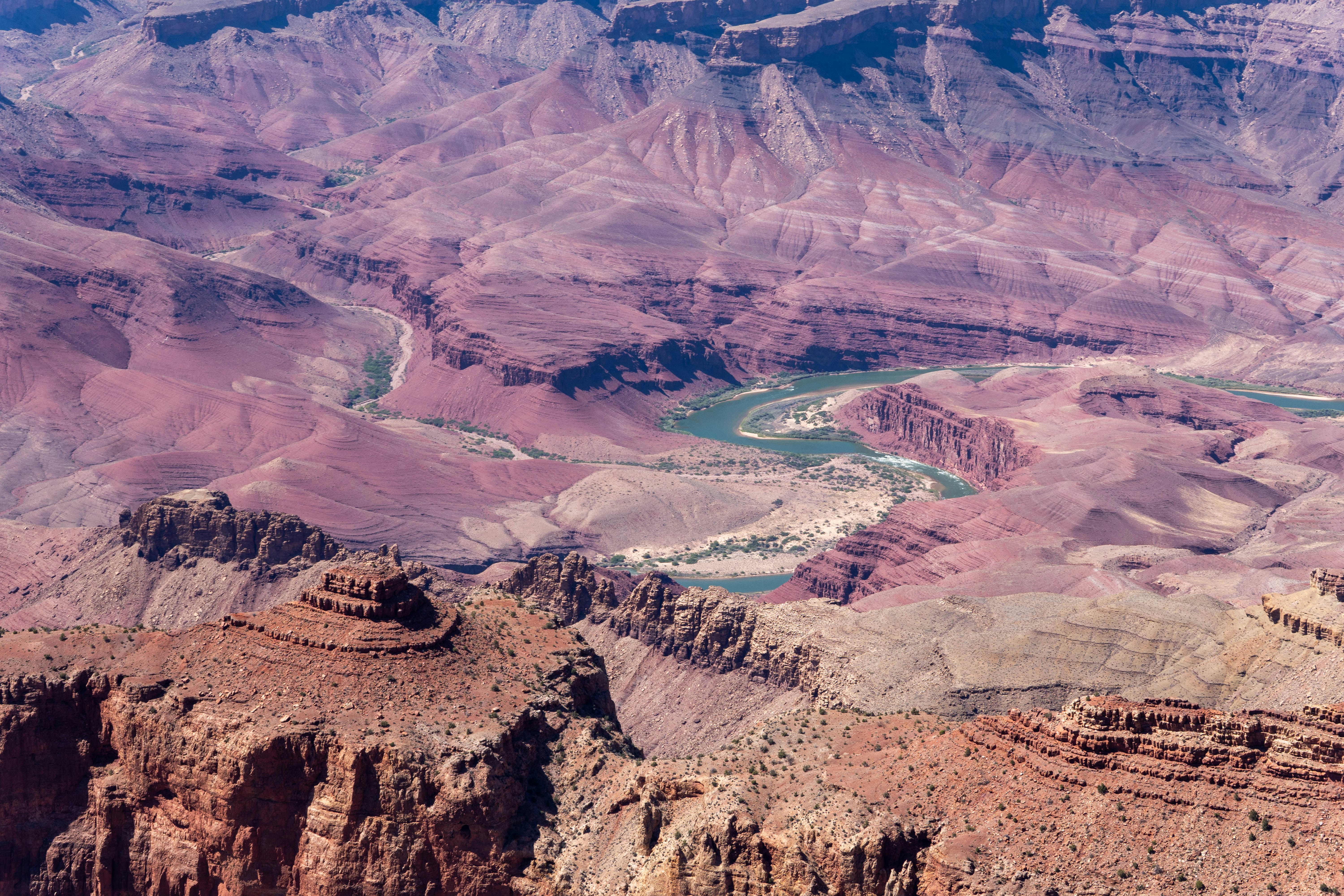 Ripple of the Colorado: Meandering River Through Red Buttes