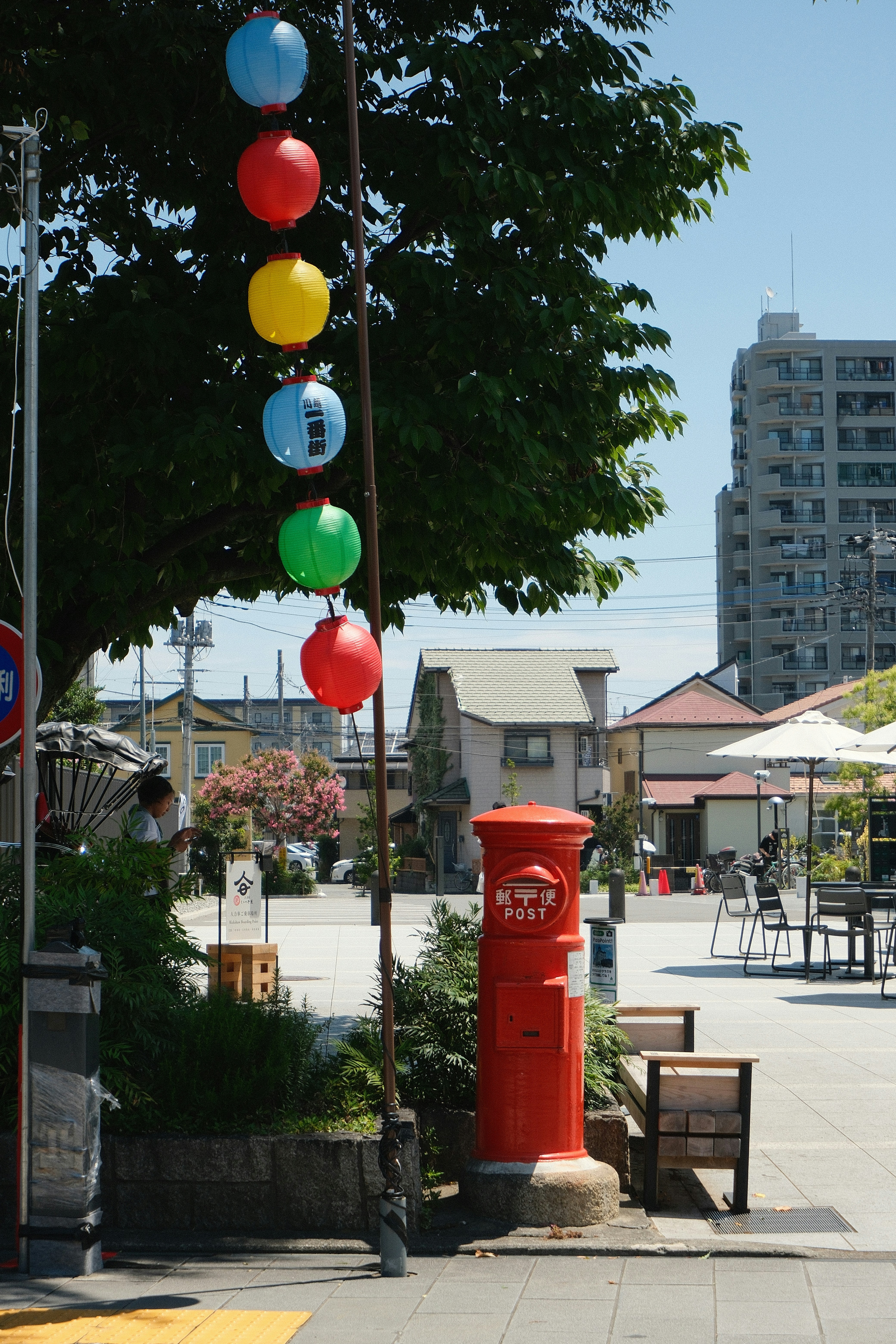 Red Post and Lanterns: A Quiet Urban Corner