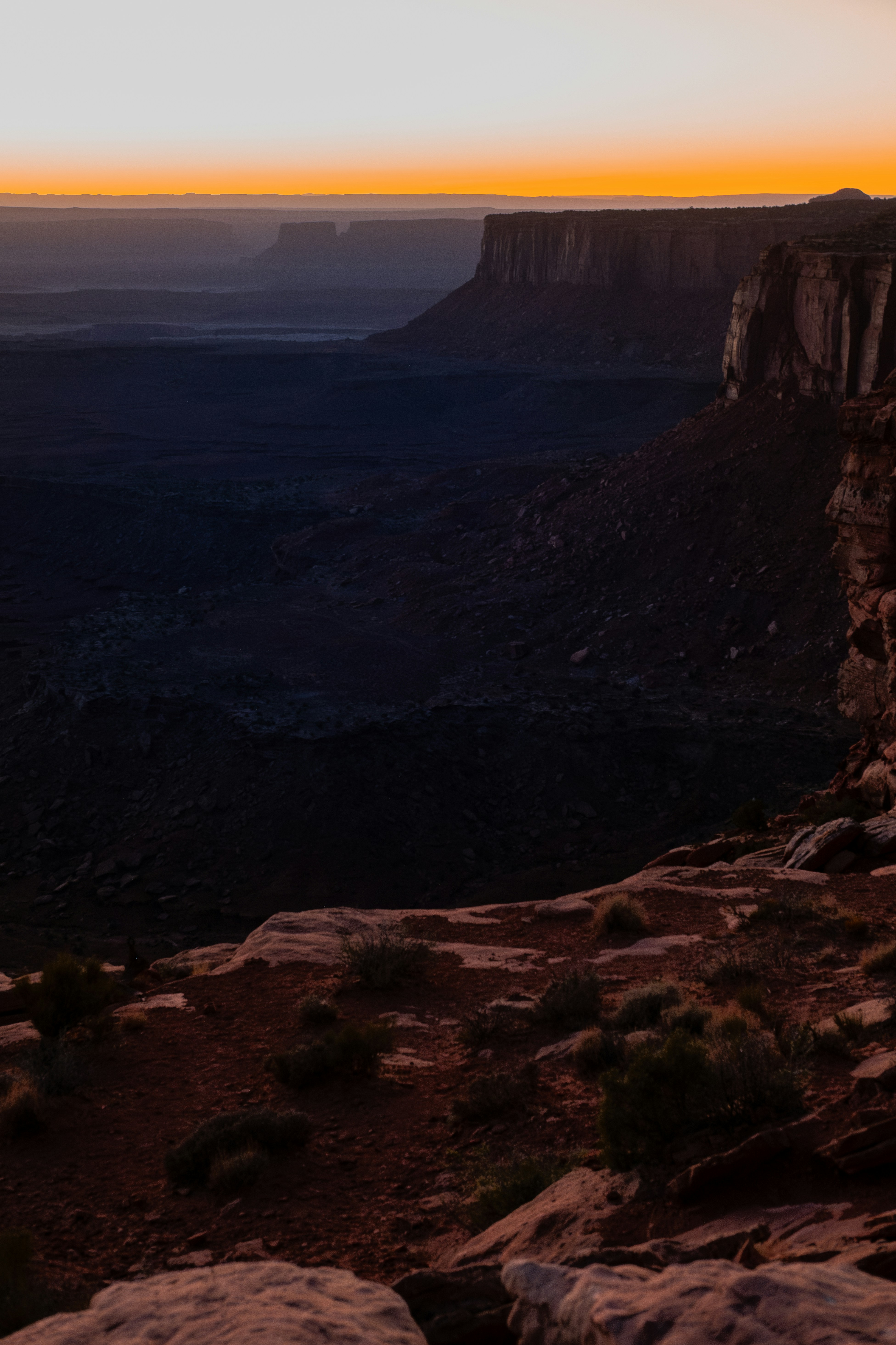 Sunset Edge: Far Canyon Cliffs at Dusk