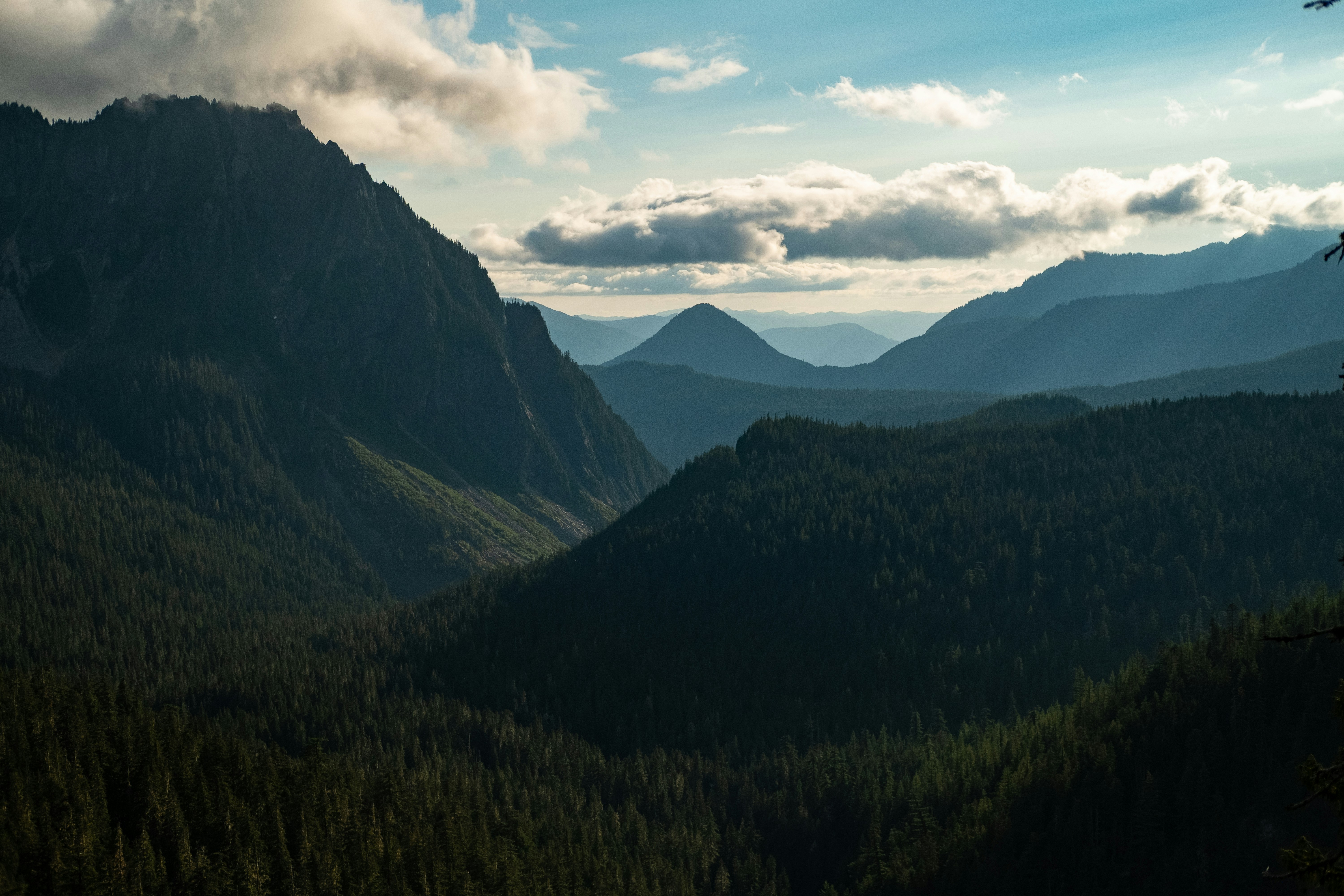 Valley Veil: Dawn Over the Alpine Spine