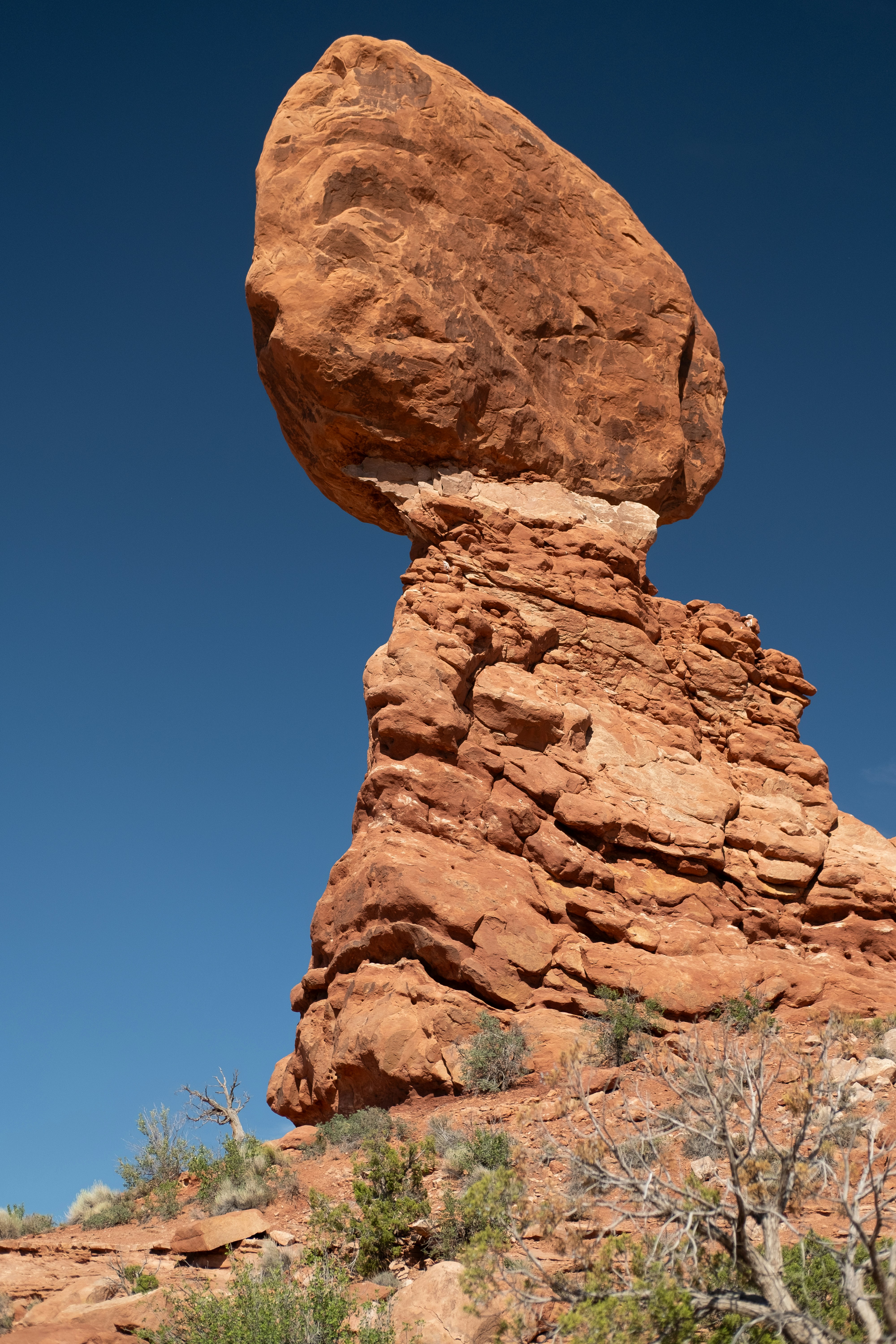 Balanced Balancing Stone: The Lone Bouldered Top in a Desert Portrait
