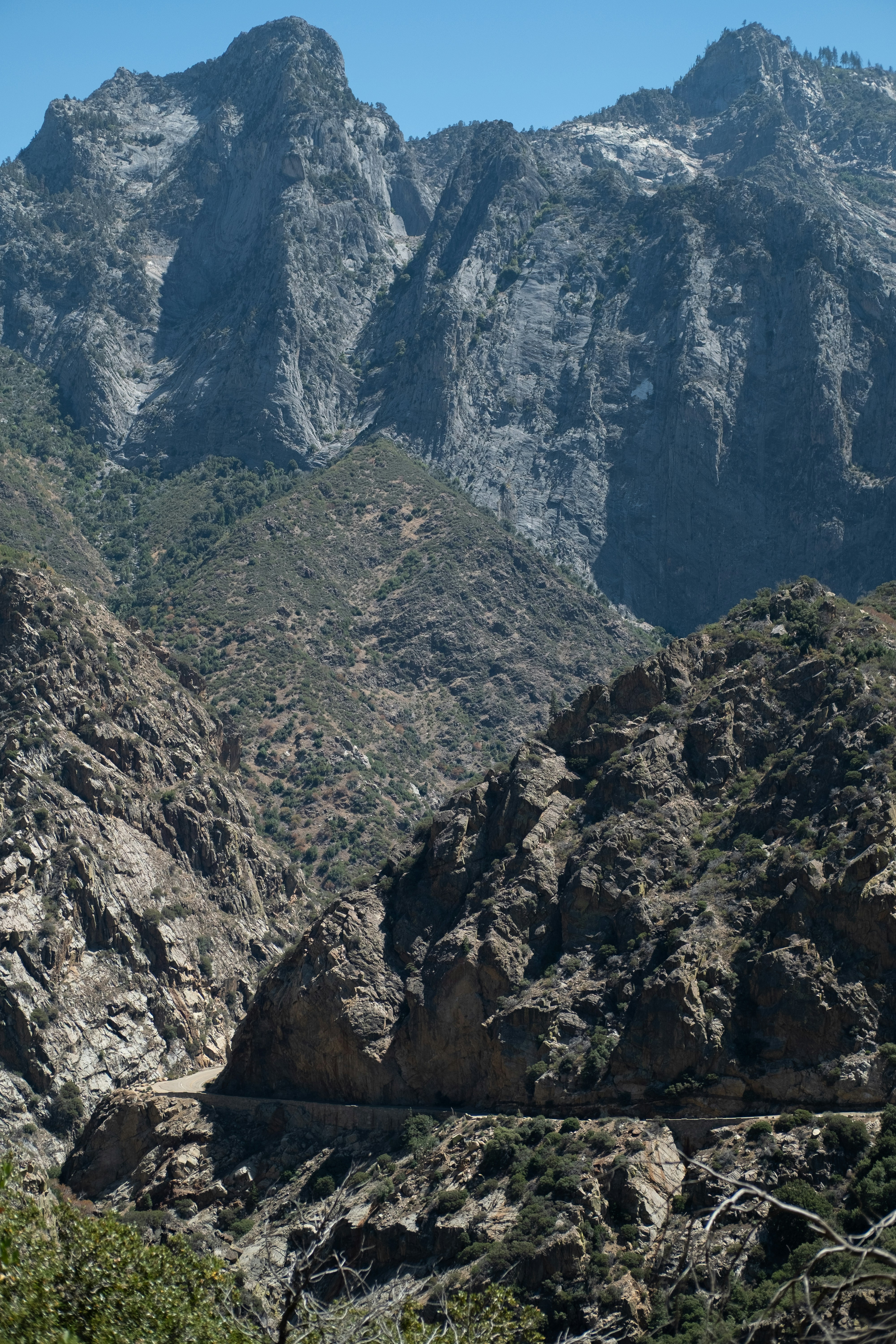 Rugged Spine: A Canyon Carved by Time Beneath a Clear Blue Sky