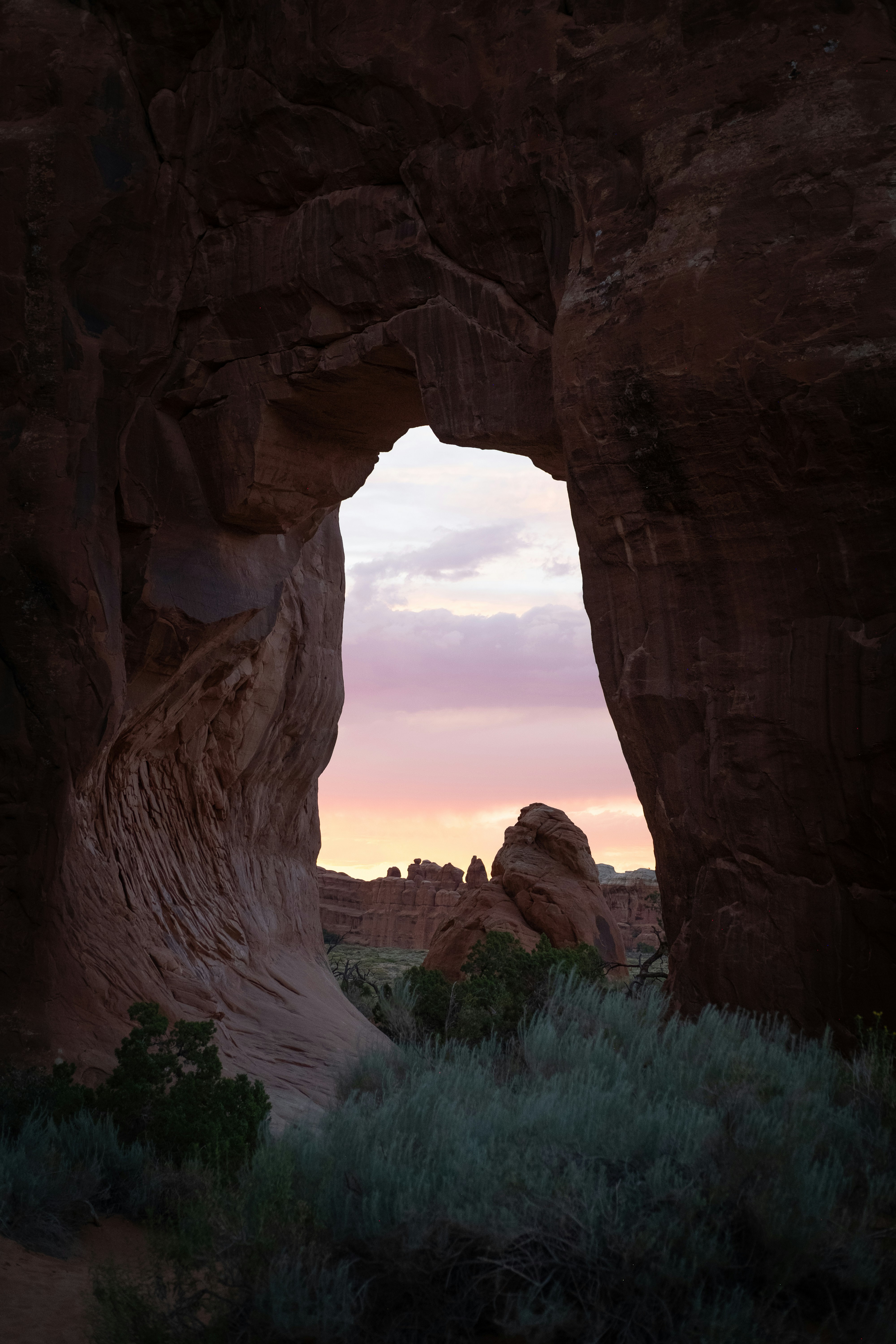 Sunset Portal: Through the Arch into the Open Valley