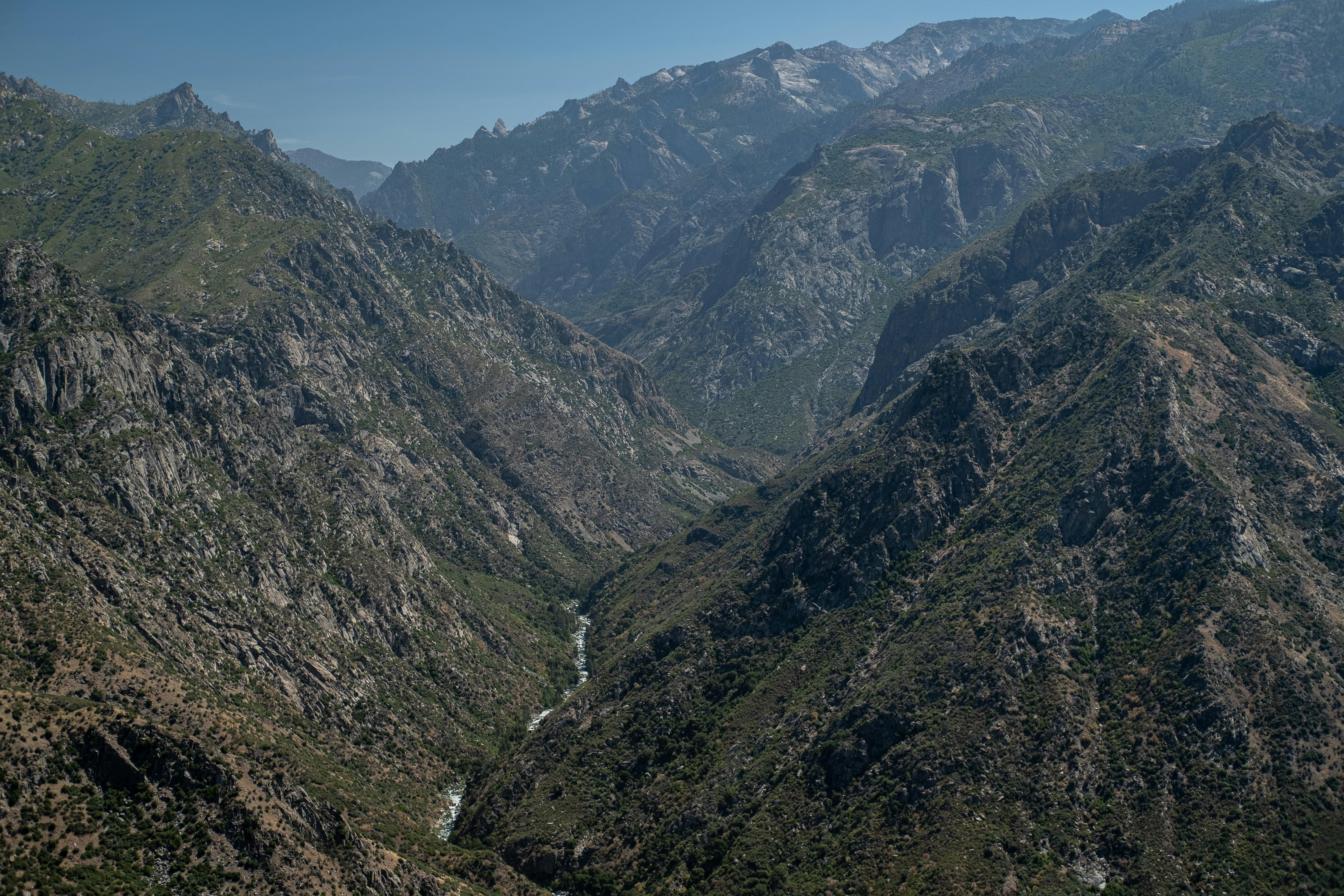 Rugged Valley Passage Between Craggy Peaks