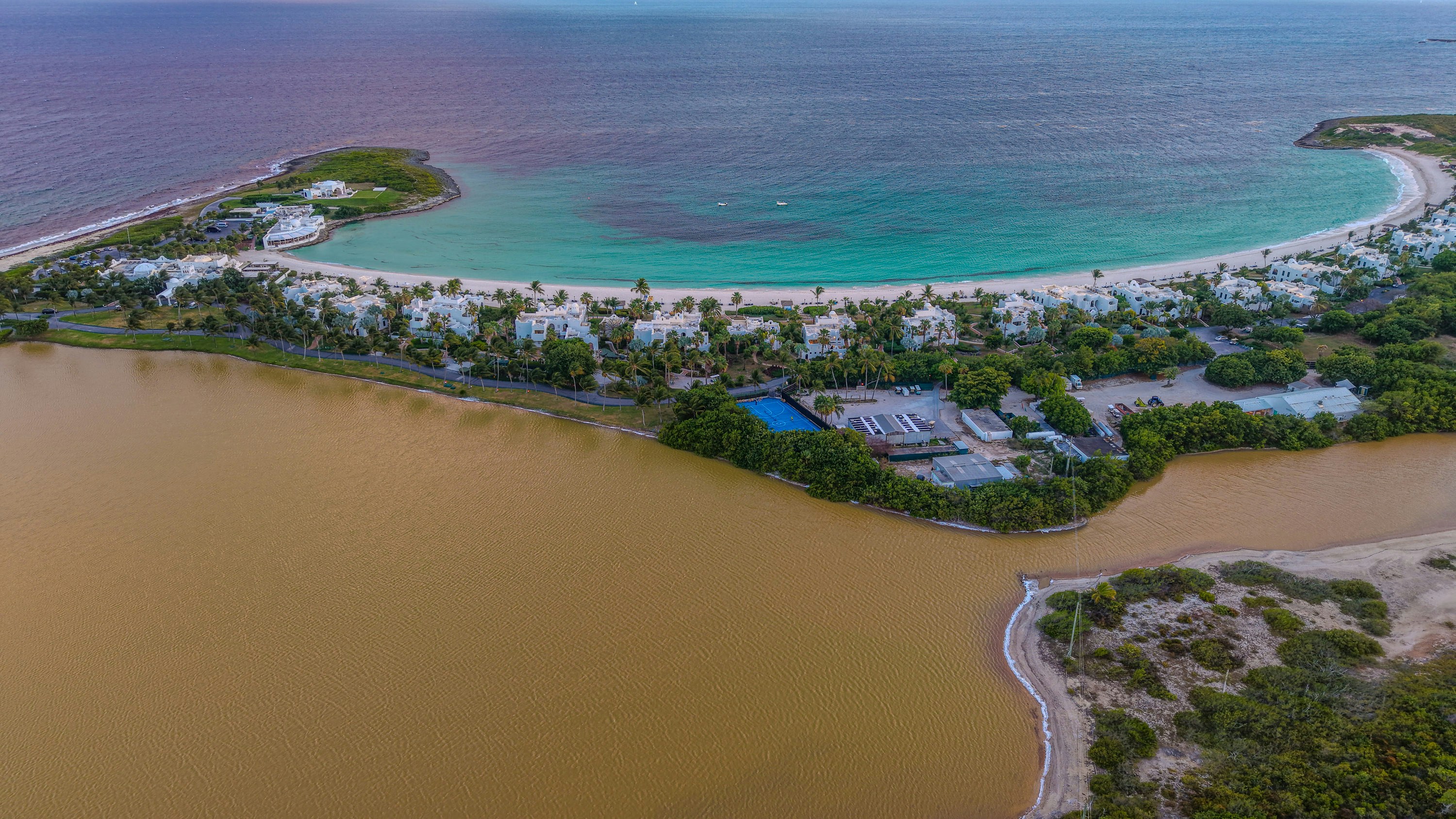 Coastal Lagoon Settlement Fringed by Turquoise Waters