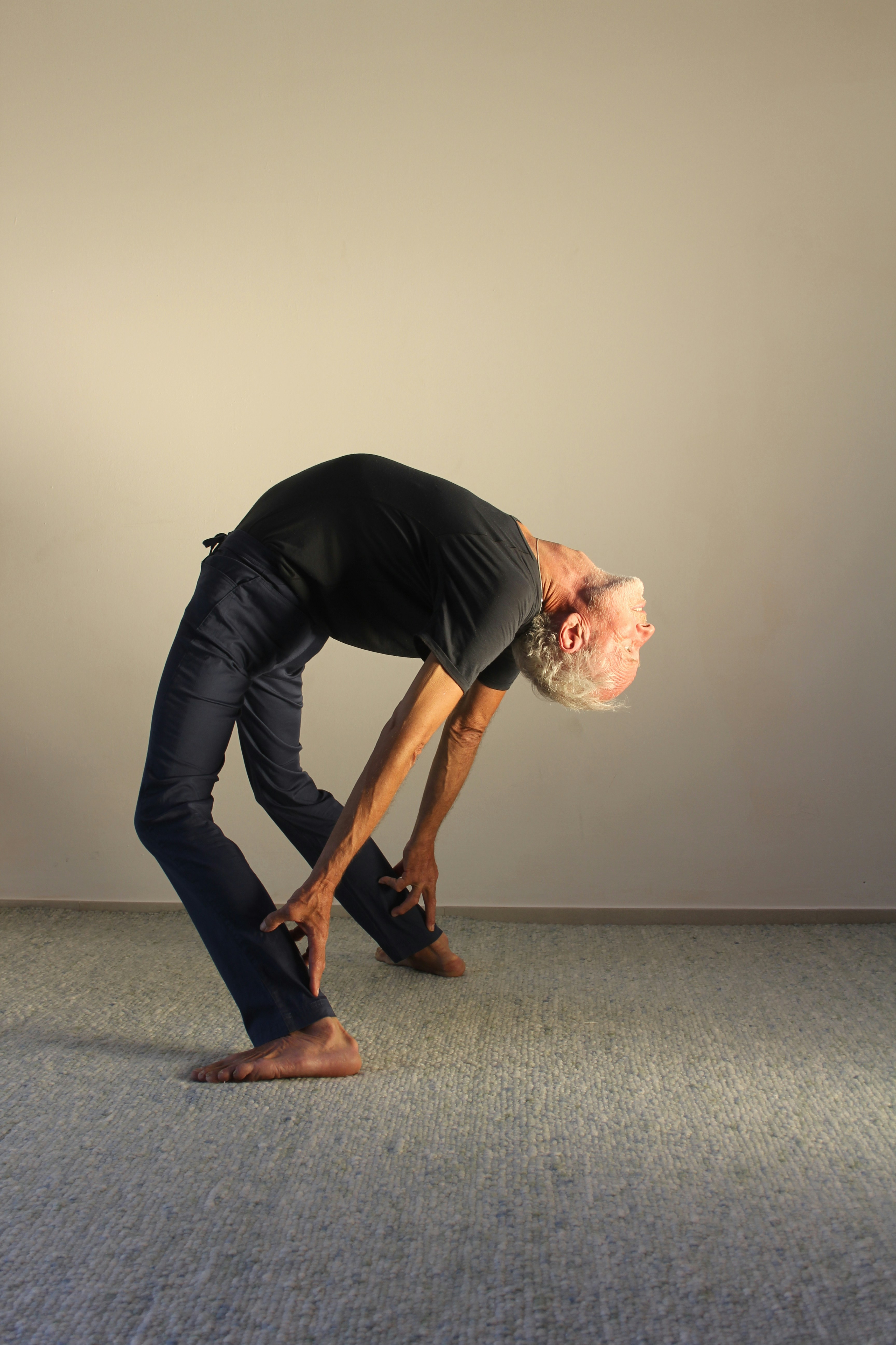 Arching Silence: A Yard-Grown Backbend in Soft Studio Light