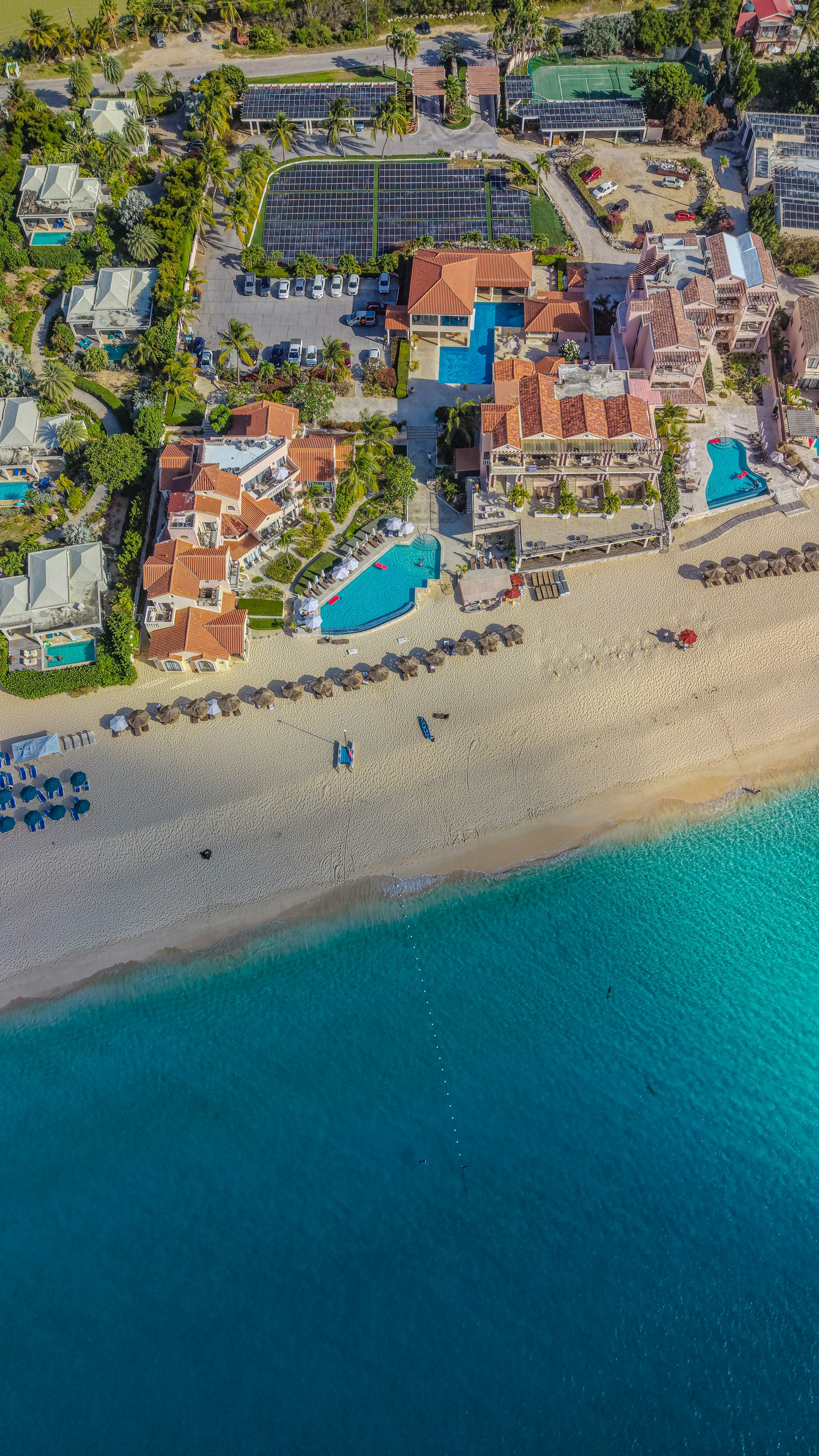 Coastal Resort from Above: Beachfront Villas and Turquoise Waters