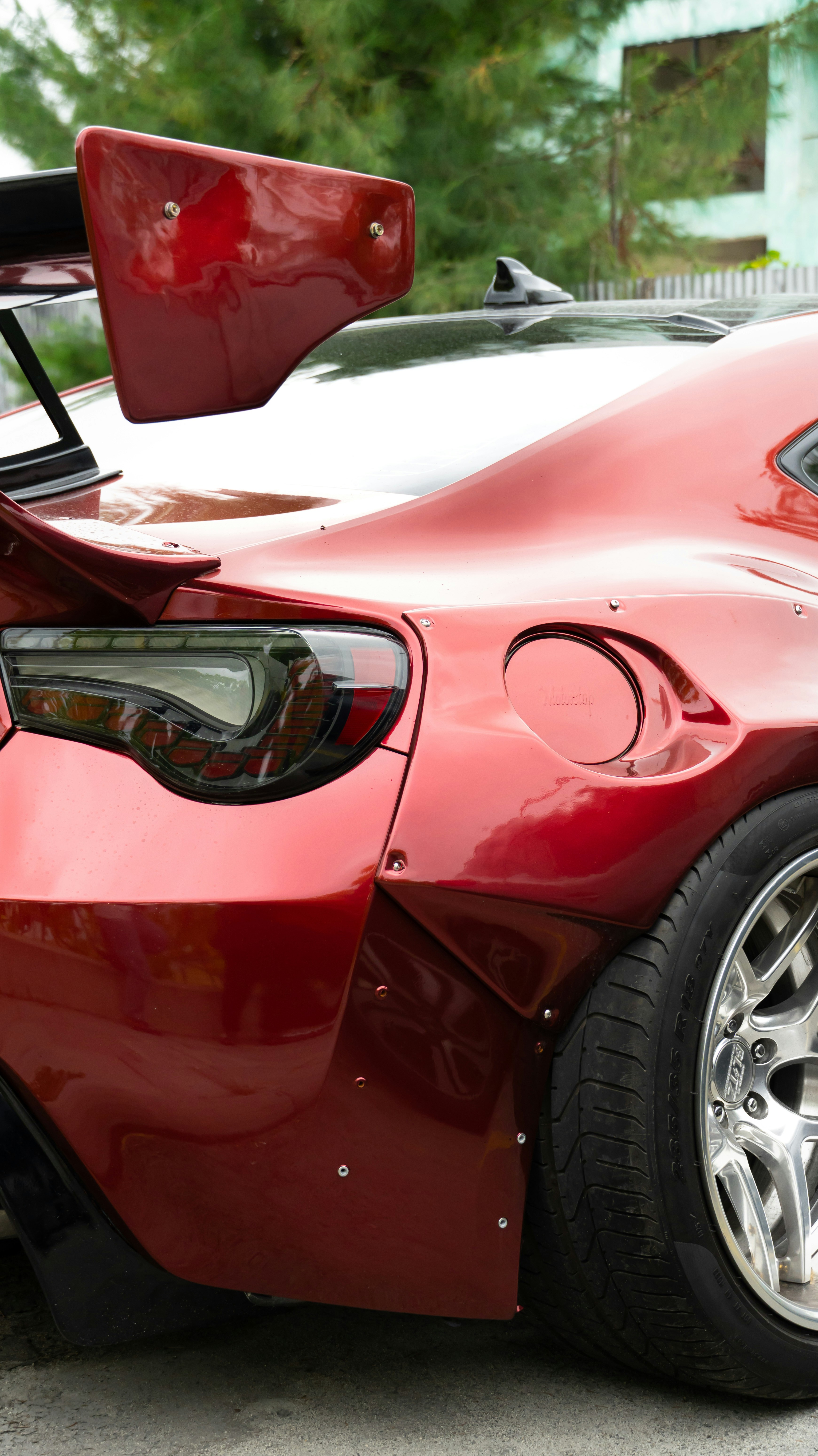 Red Precision: Close-Up of a Turbocharged Rear Quarter
