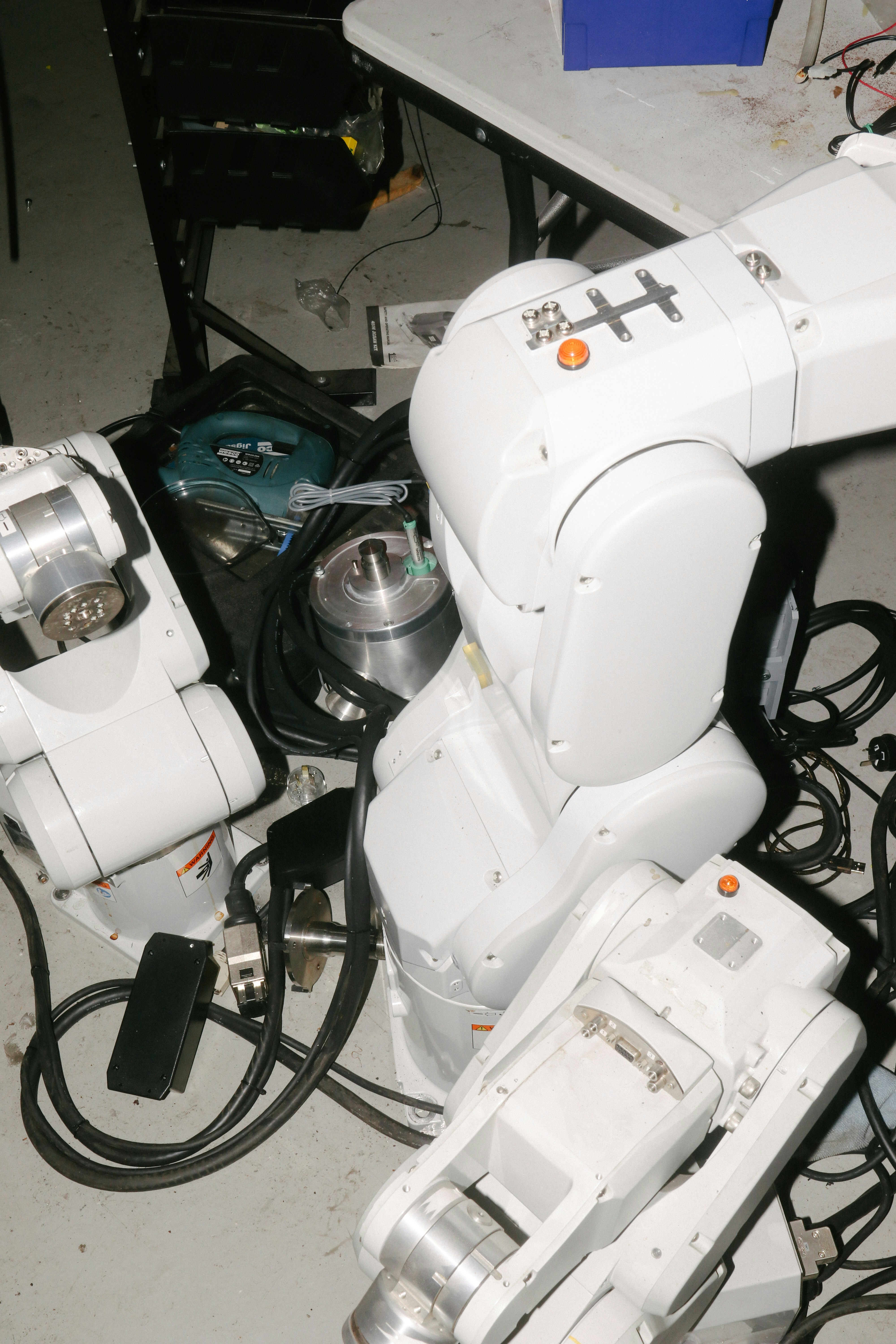 Silent Torque: A Close-Cropped View of Industrial Robotics in a Lab Corner