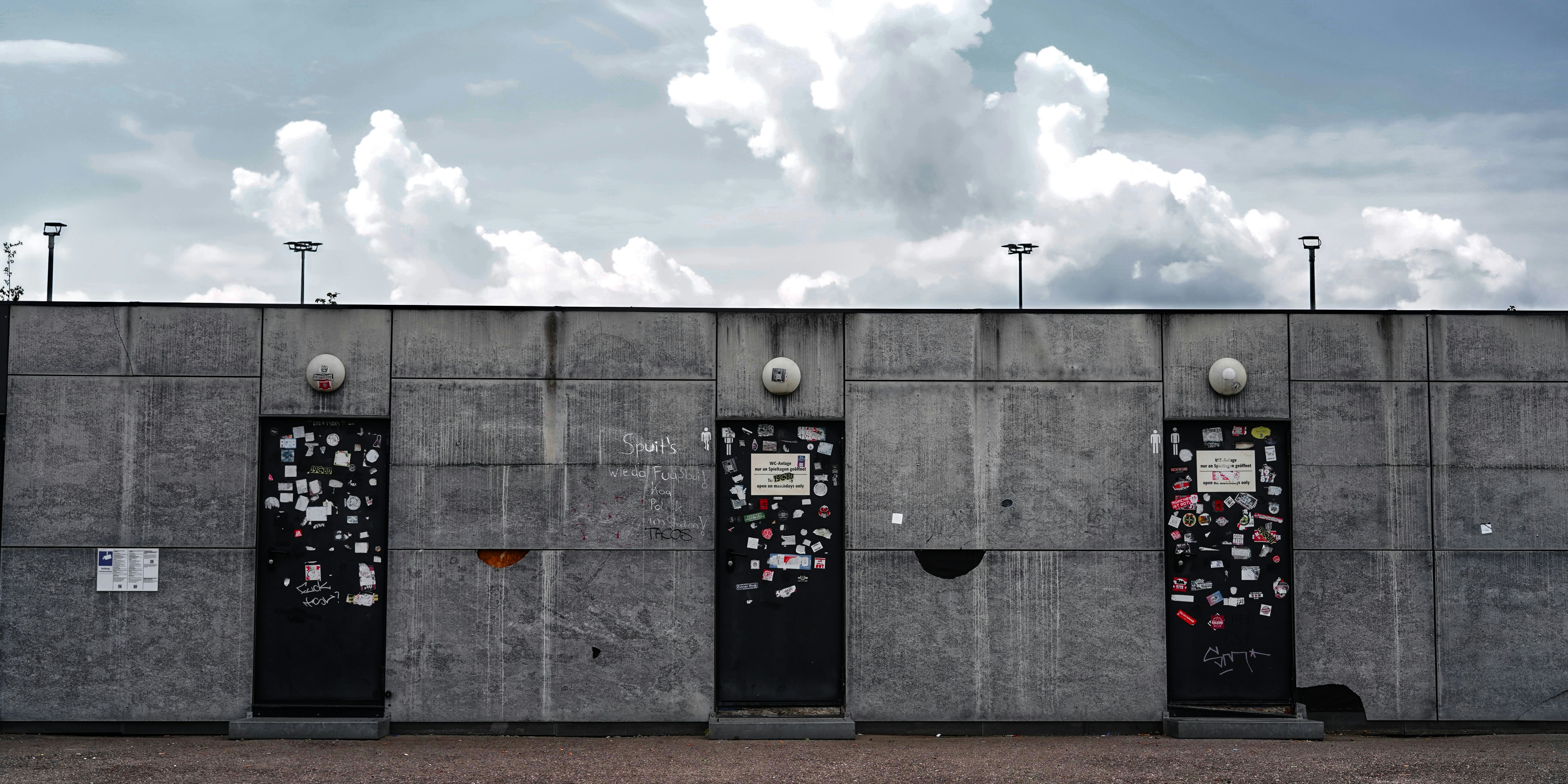 Lockdown Doors: A Row of Stickered Concrete
