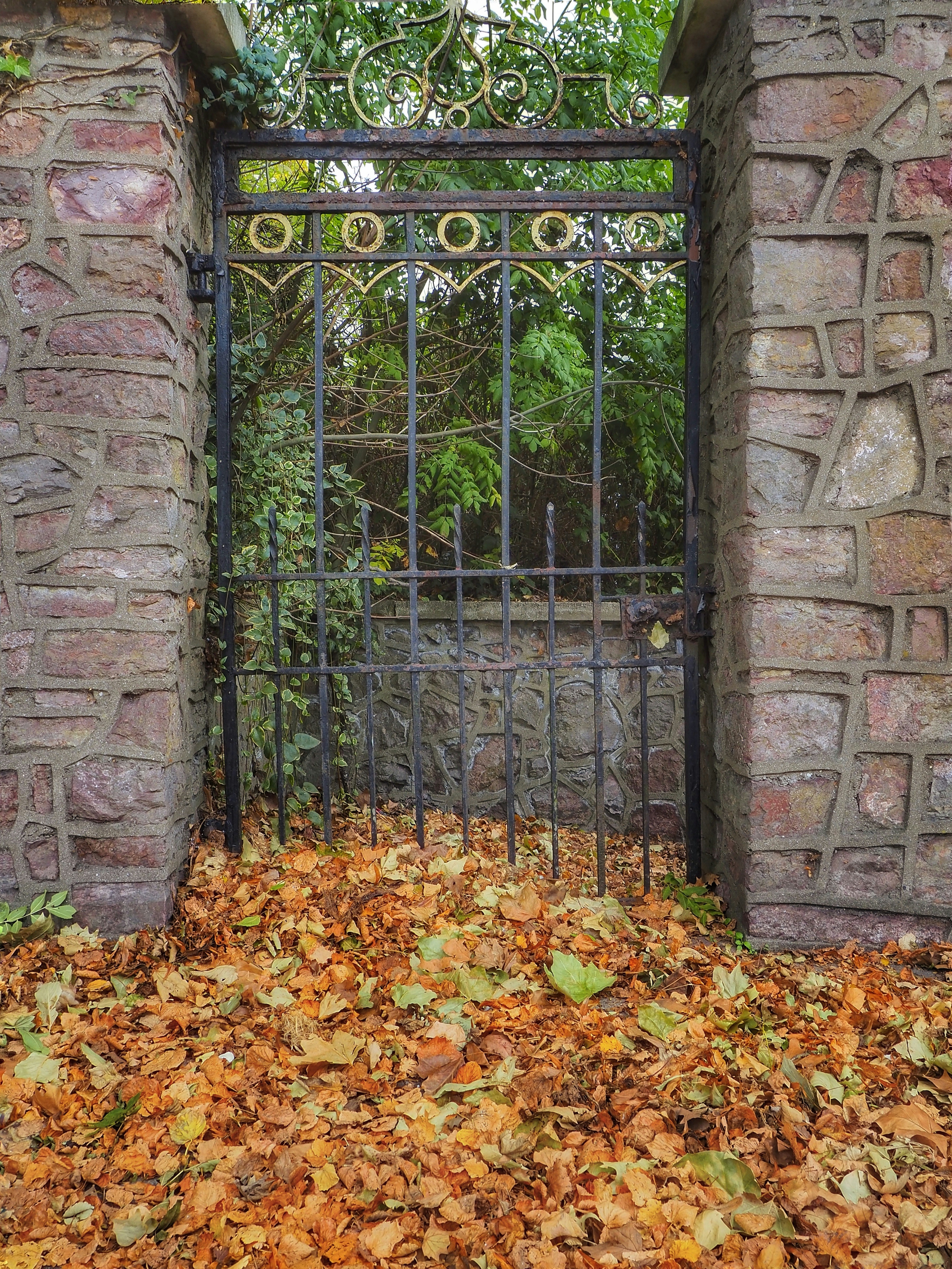 Iron Gate to Autumn Garden: Between Stone Walls