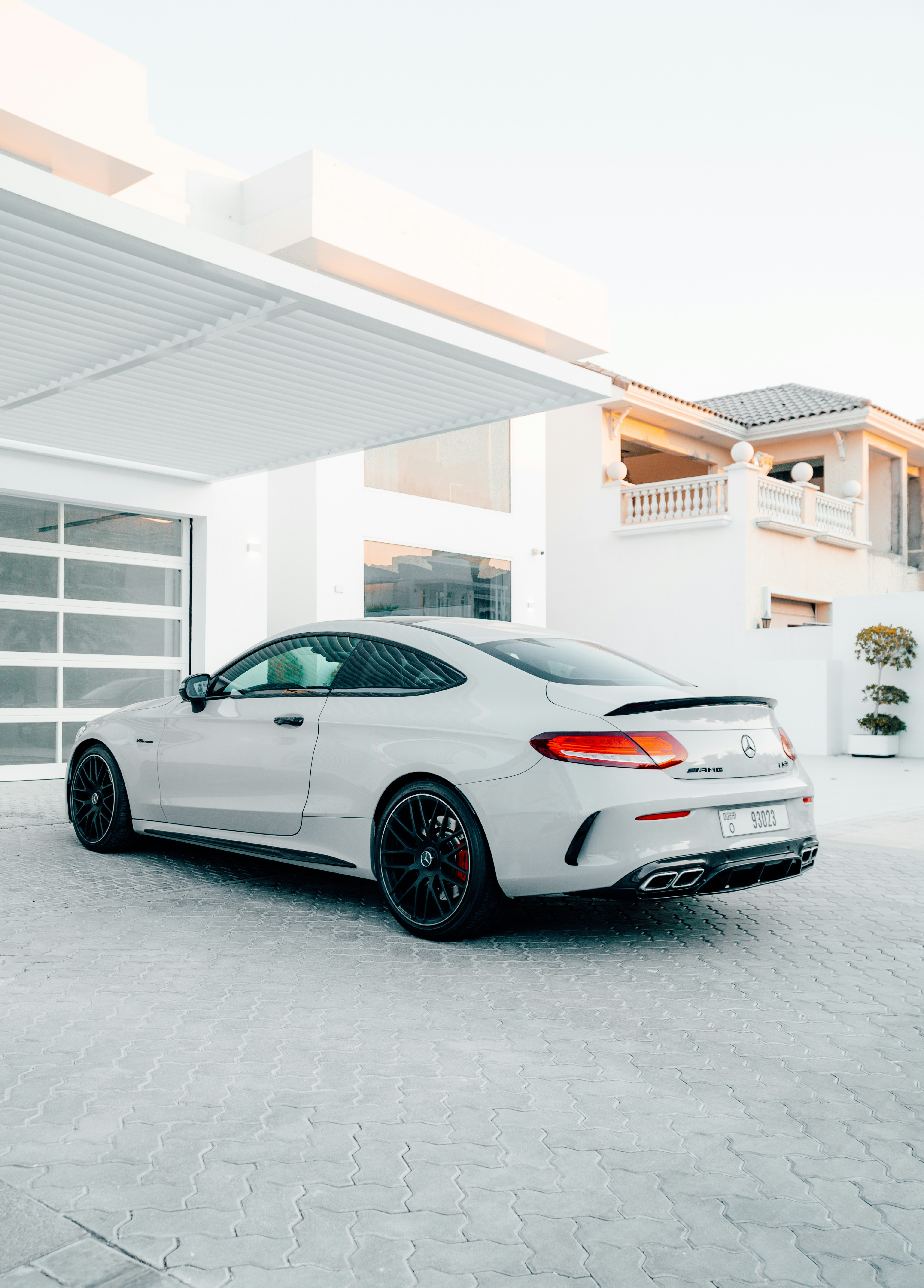 White AMG GT-Seduction: A Quiet Driveway Portrait
