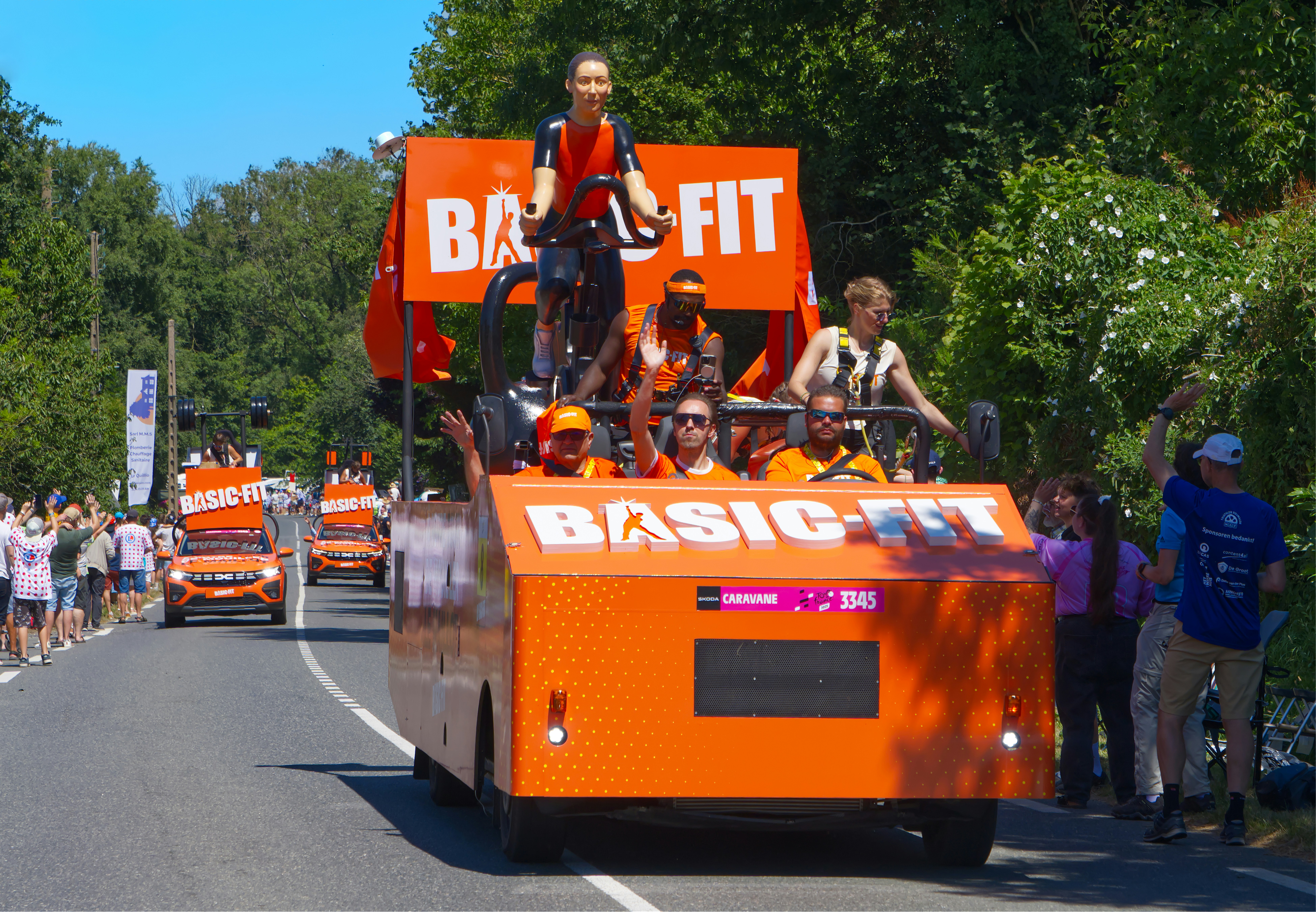 Orange Parade: The Lift Ride with a Front-Row Crew