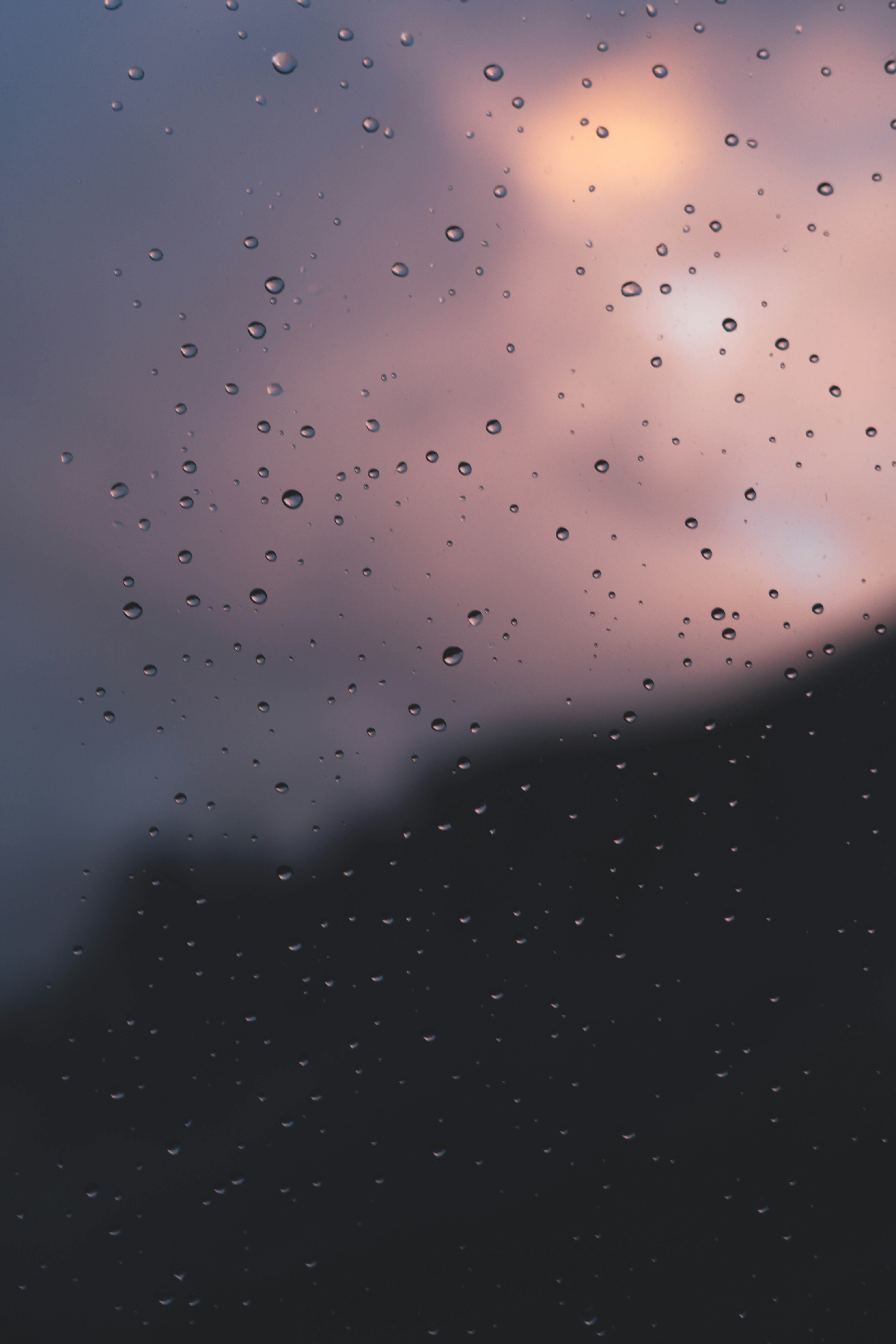Raindrop Mosaic Against a Dusk Sky