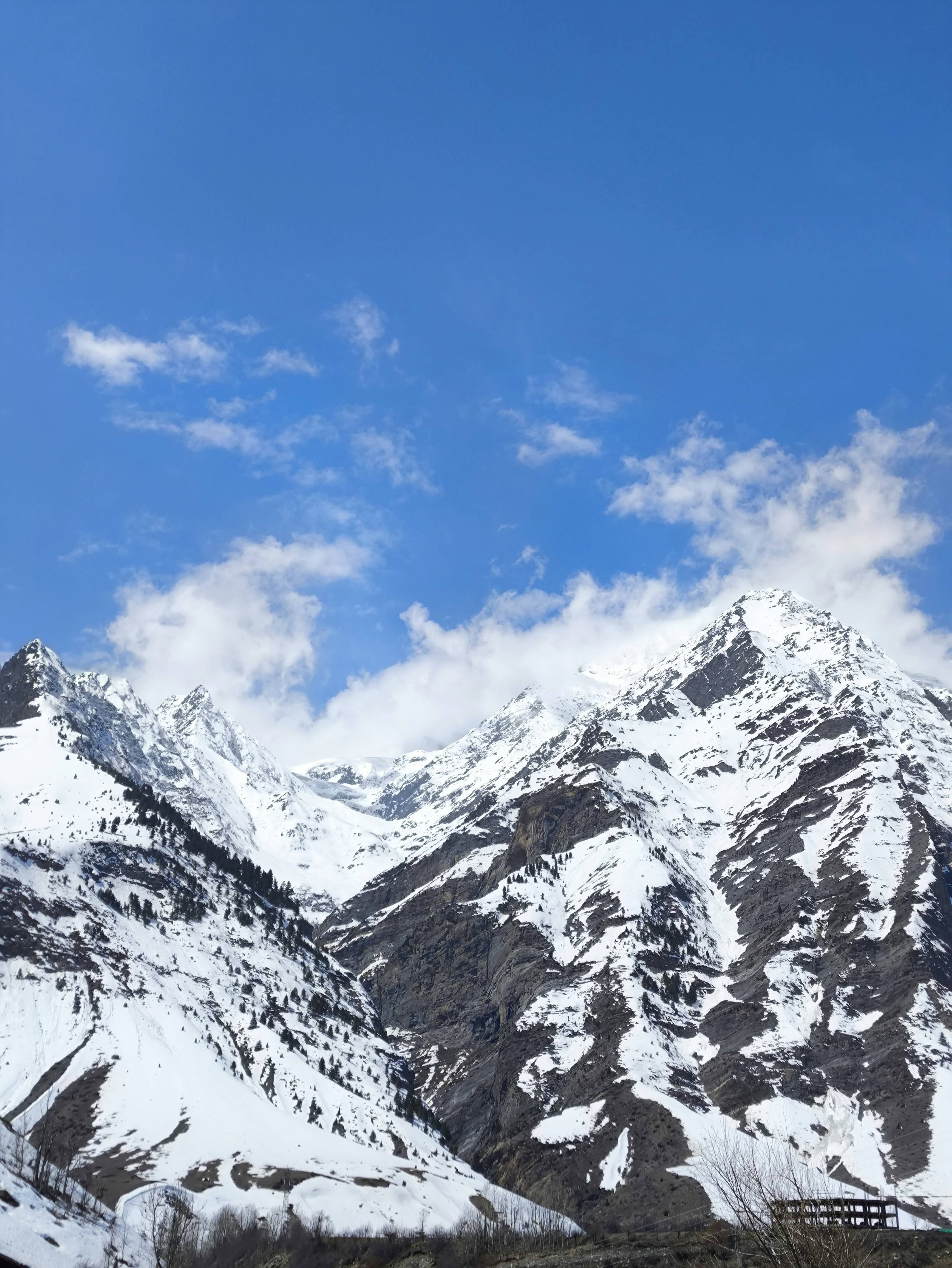 Snowbound Peaks Under a Clear Alpine Sky