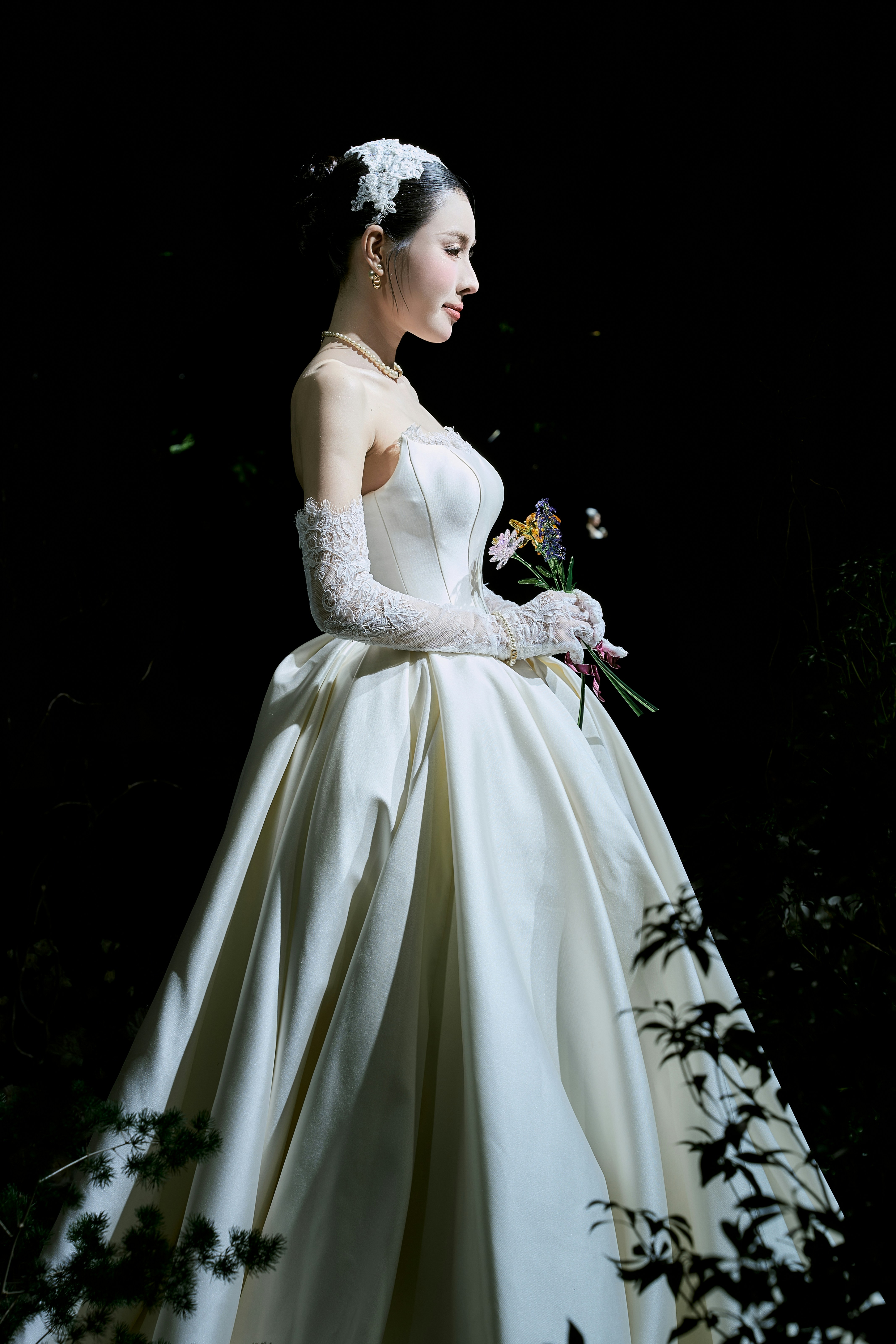Portrait of a bridal silhouette under night-lighting