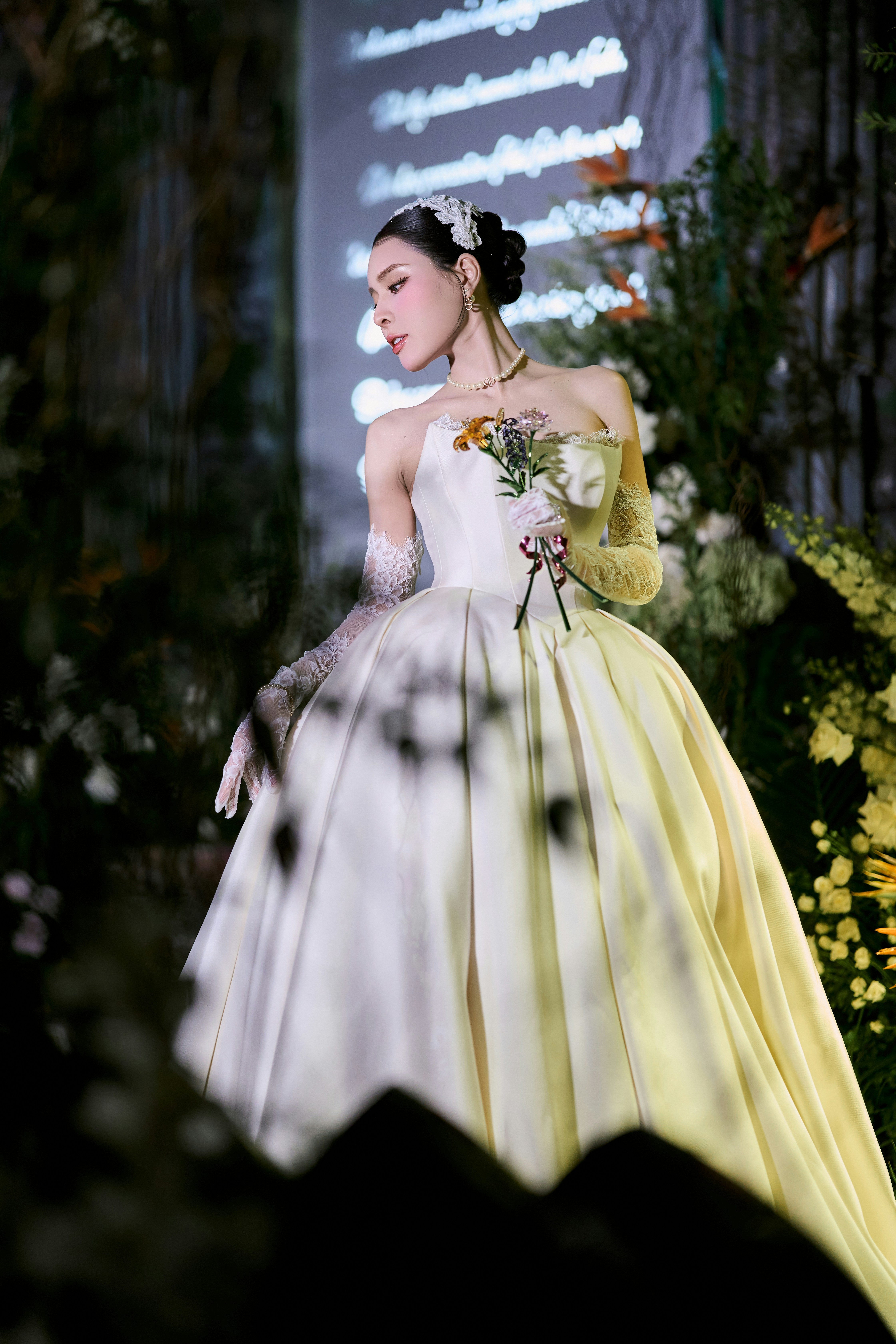 Elegant Bride in a Dreamy Moment on a Floral Runway