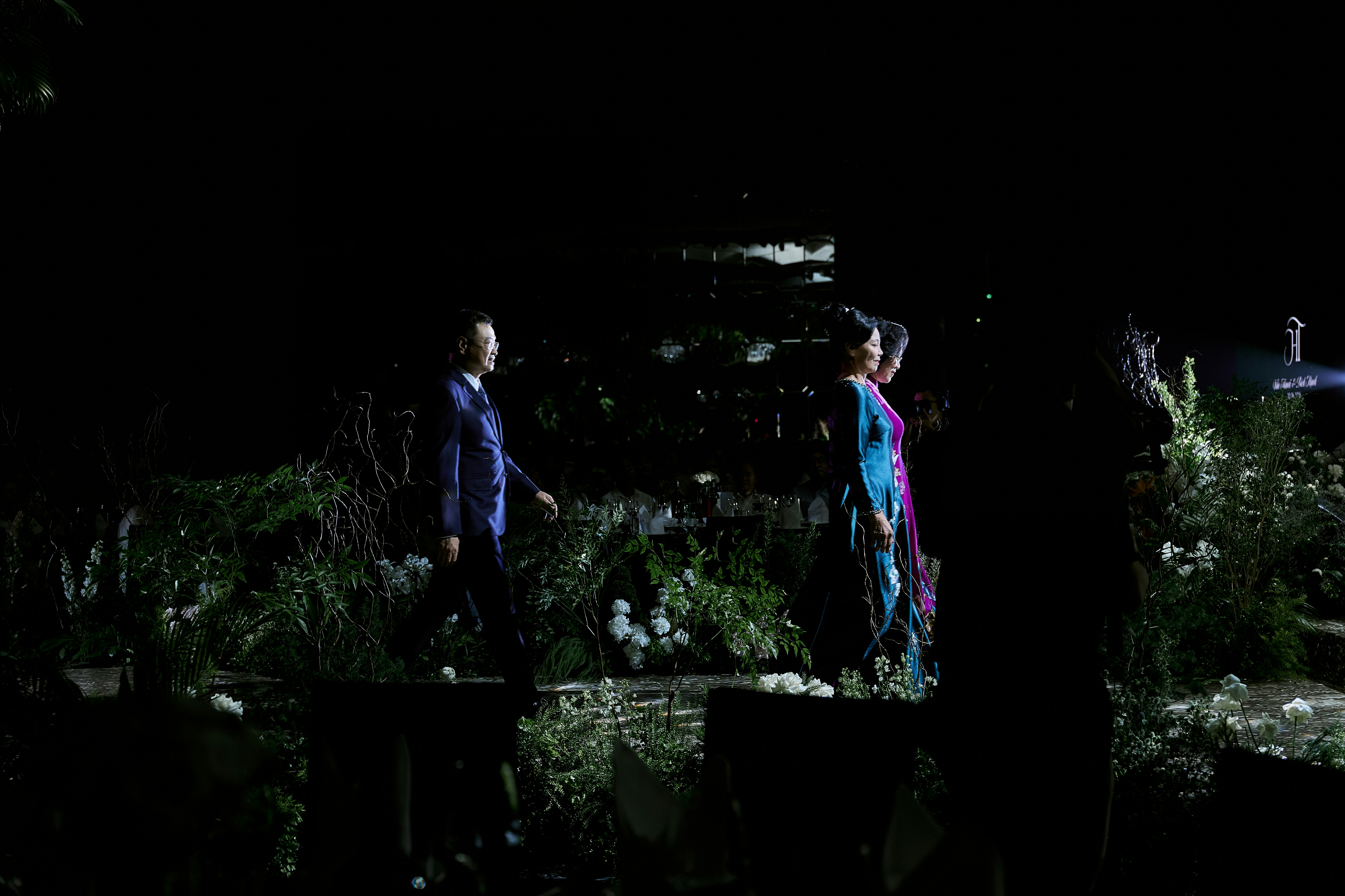 Two Figures in a Dim Garden Stage
