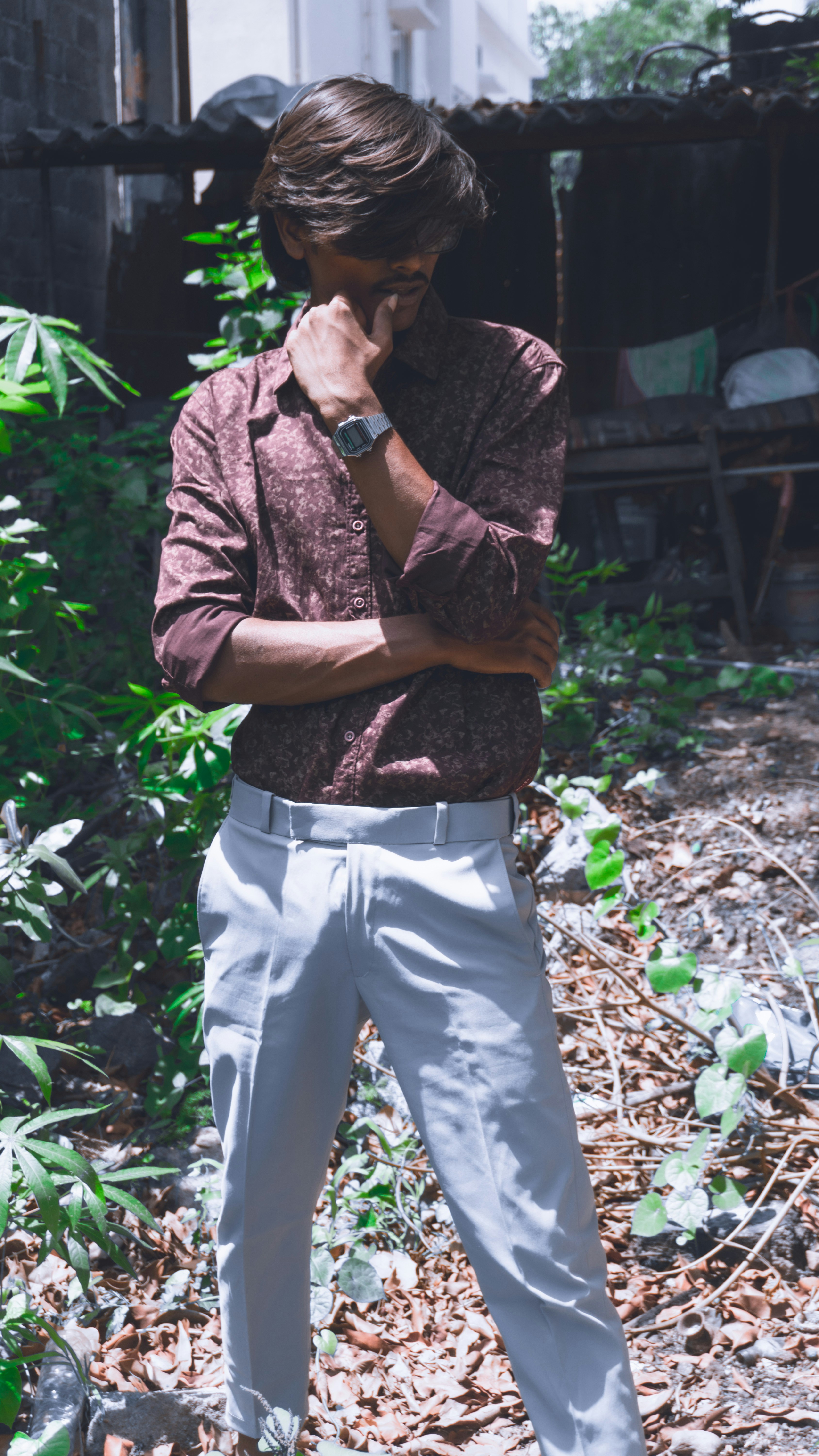Portrait in Dappled Light: The Thoughtful Stance in a Quiet Oasis
