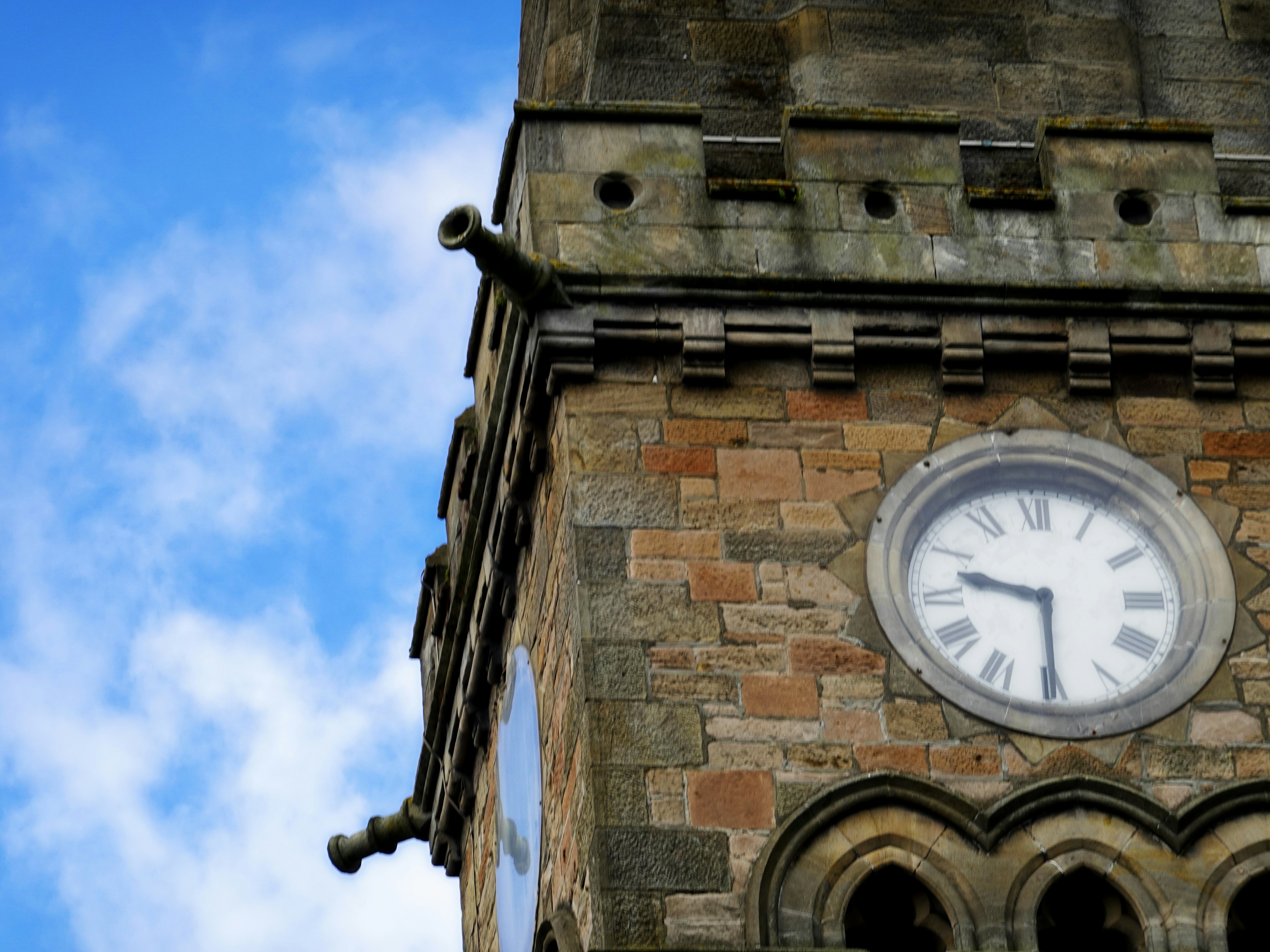 Stone Clock Tower Reaching Toward the Sky