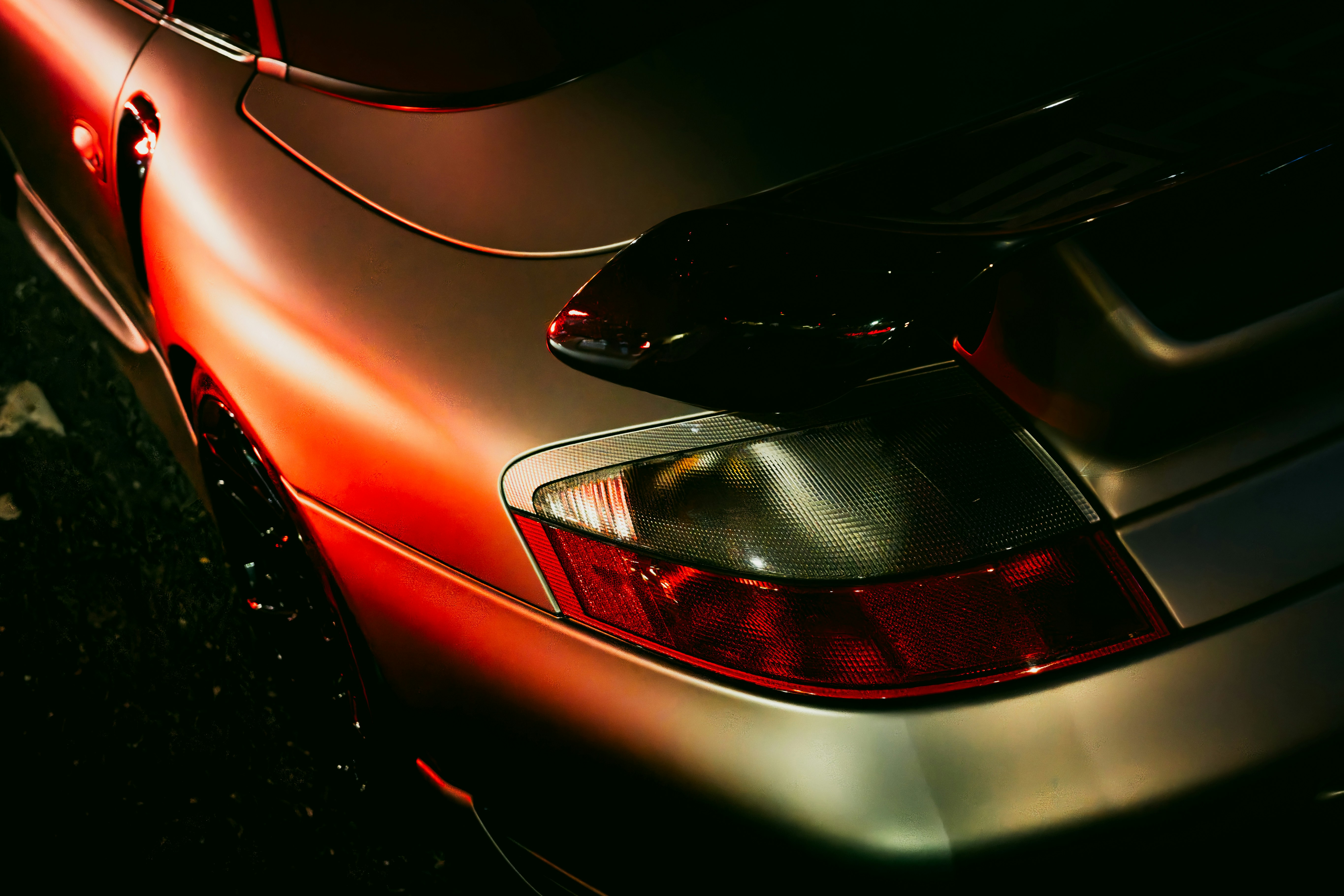 Chromed Curves: A Neon-Tinted Rear Glint