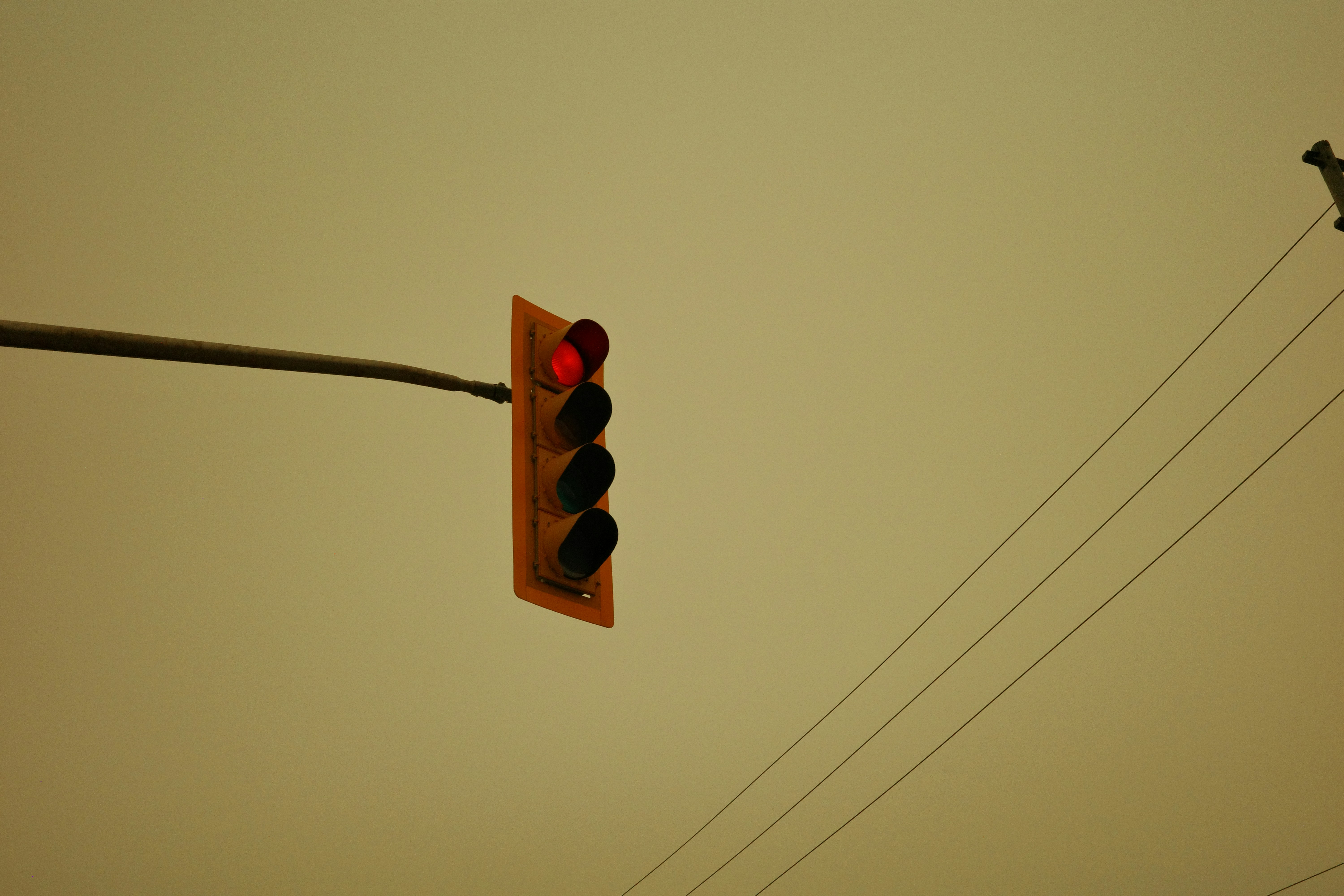 Red Signal Against a Quiet Sky
