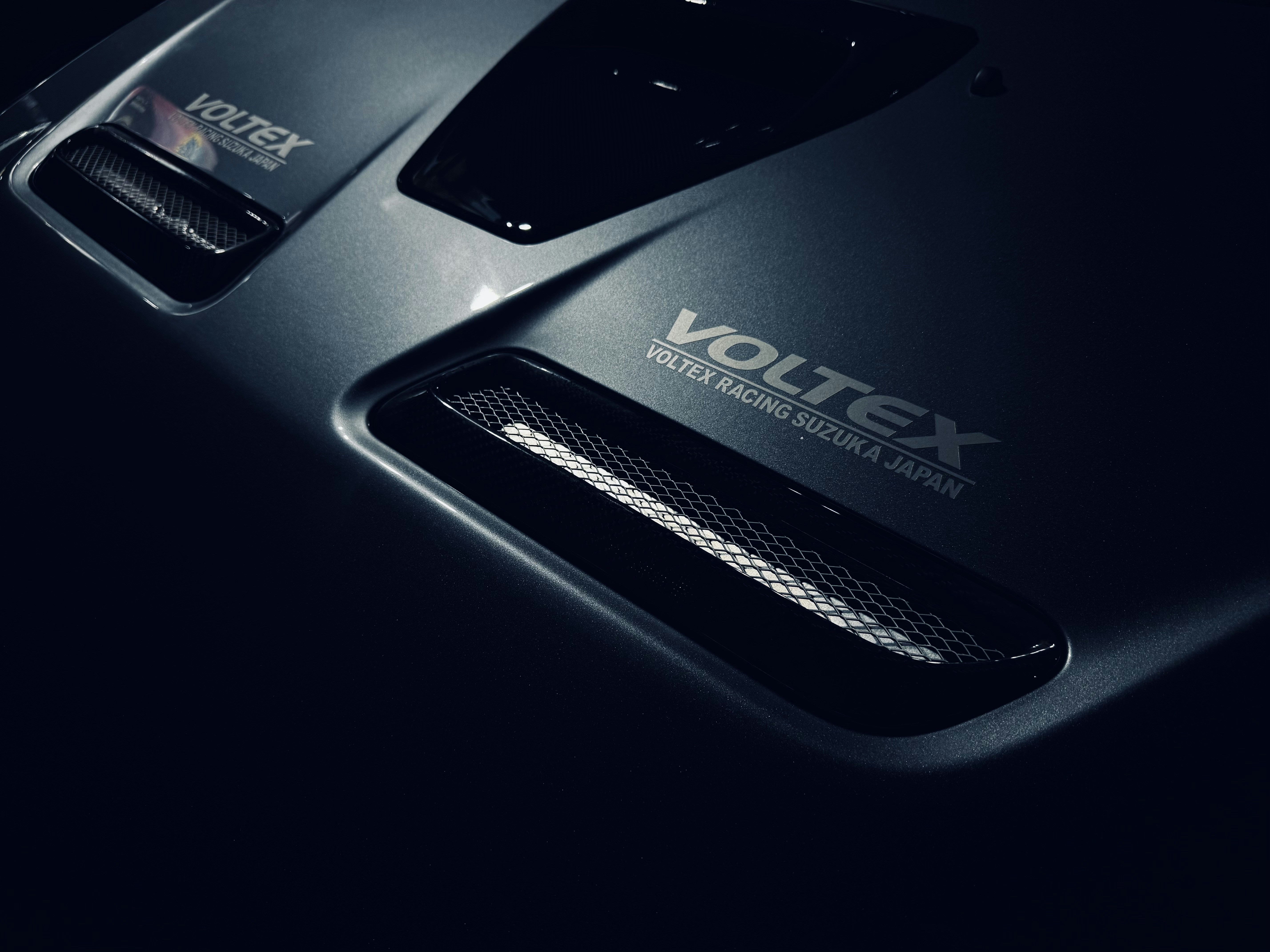 Voltex Engine Grille Under Dark Glass
