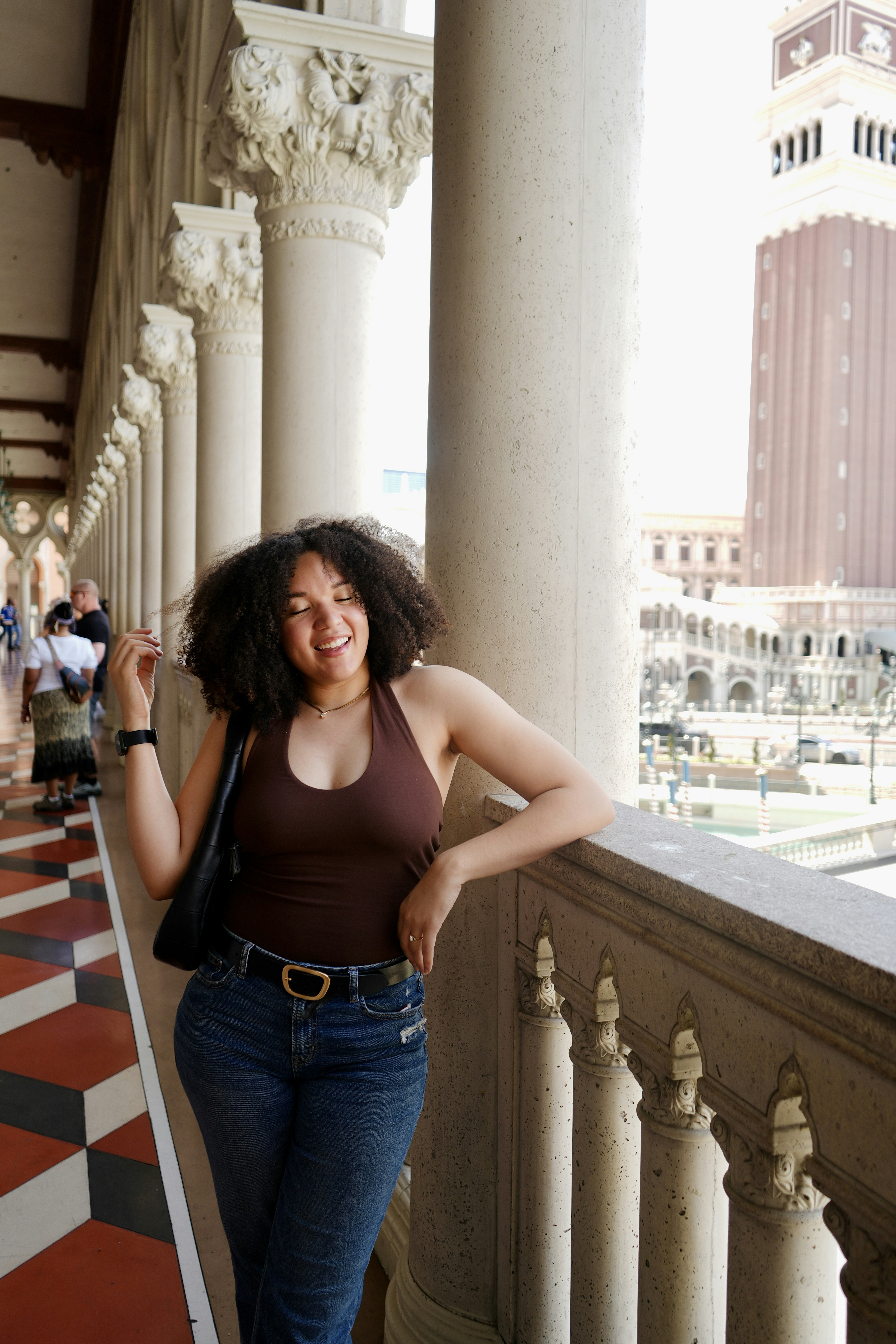 Sunlit Confidence on the Colonnade