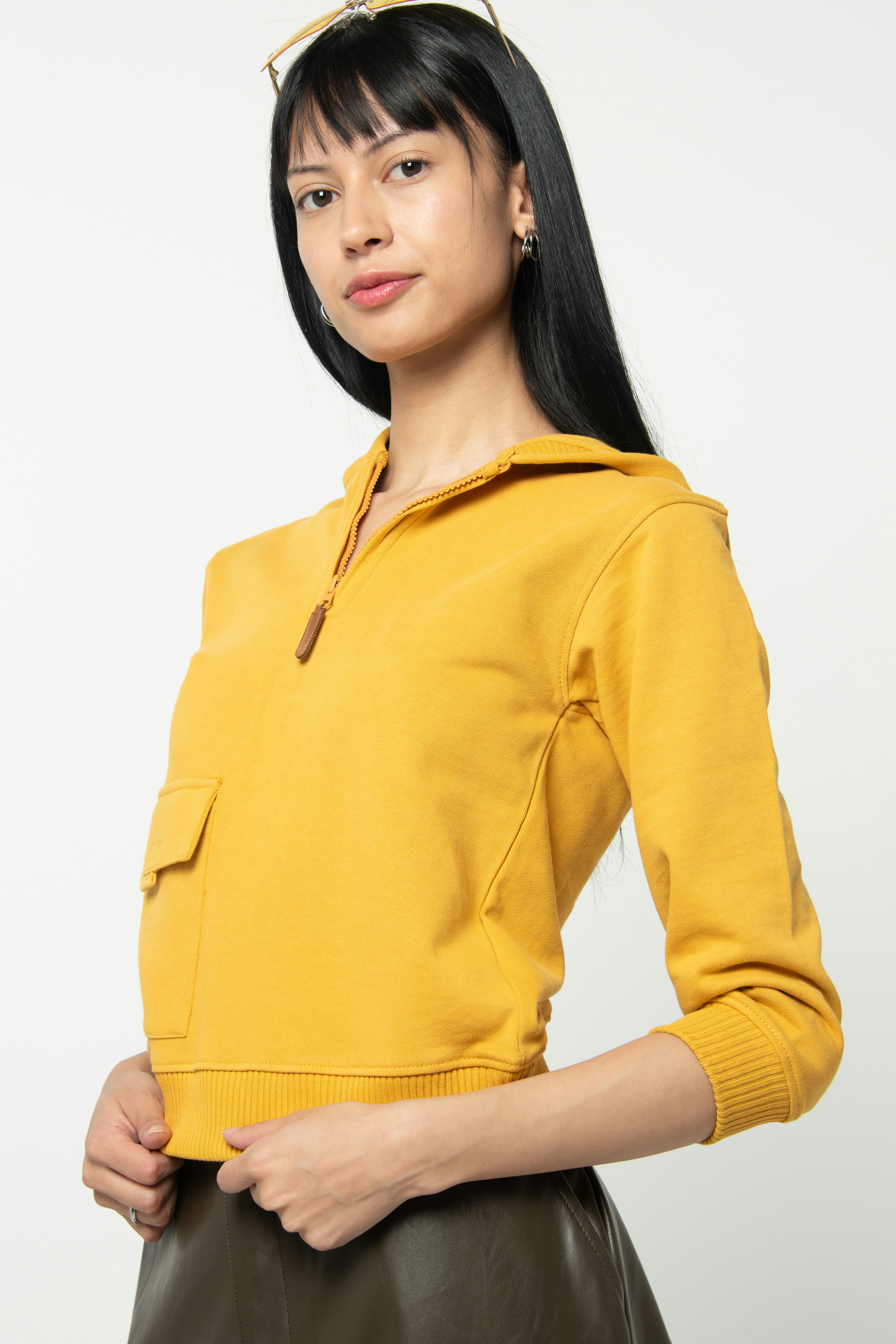 Portrait in Warm Light: The Yellow Hoodie and Confident Gaze