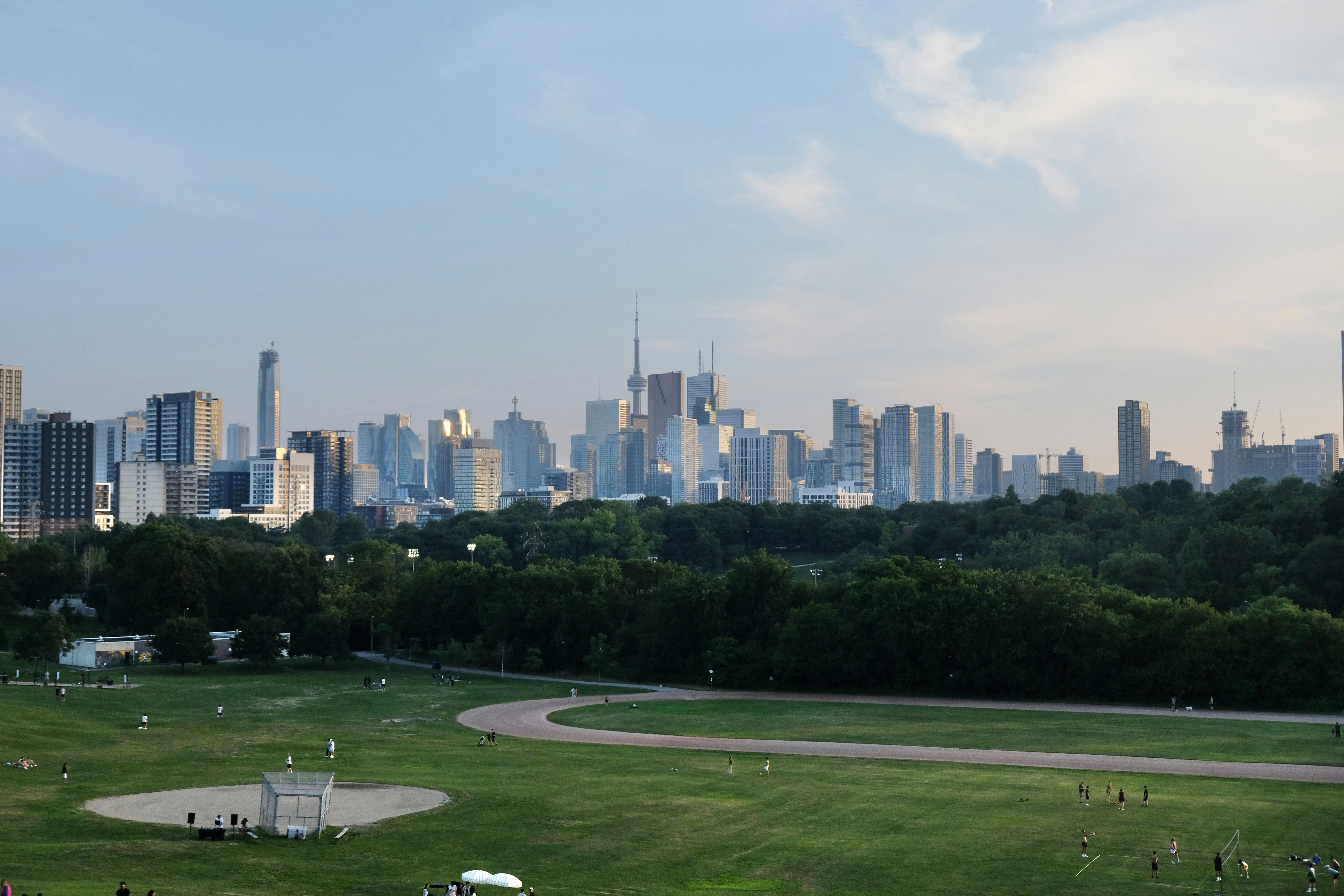 Urban Mirage over the Greenbelt: A Quiet Park Meets a Rising Skyline